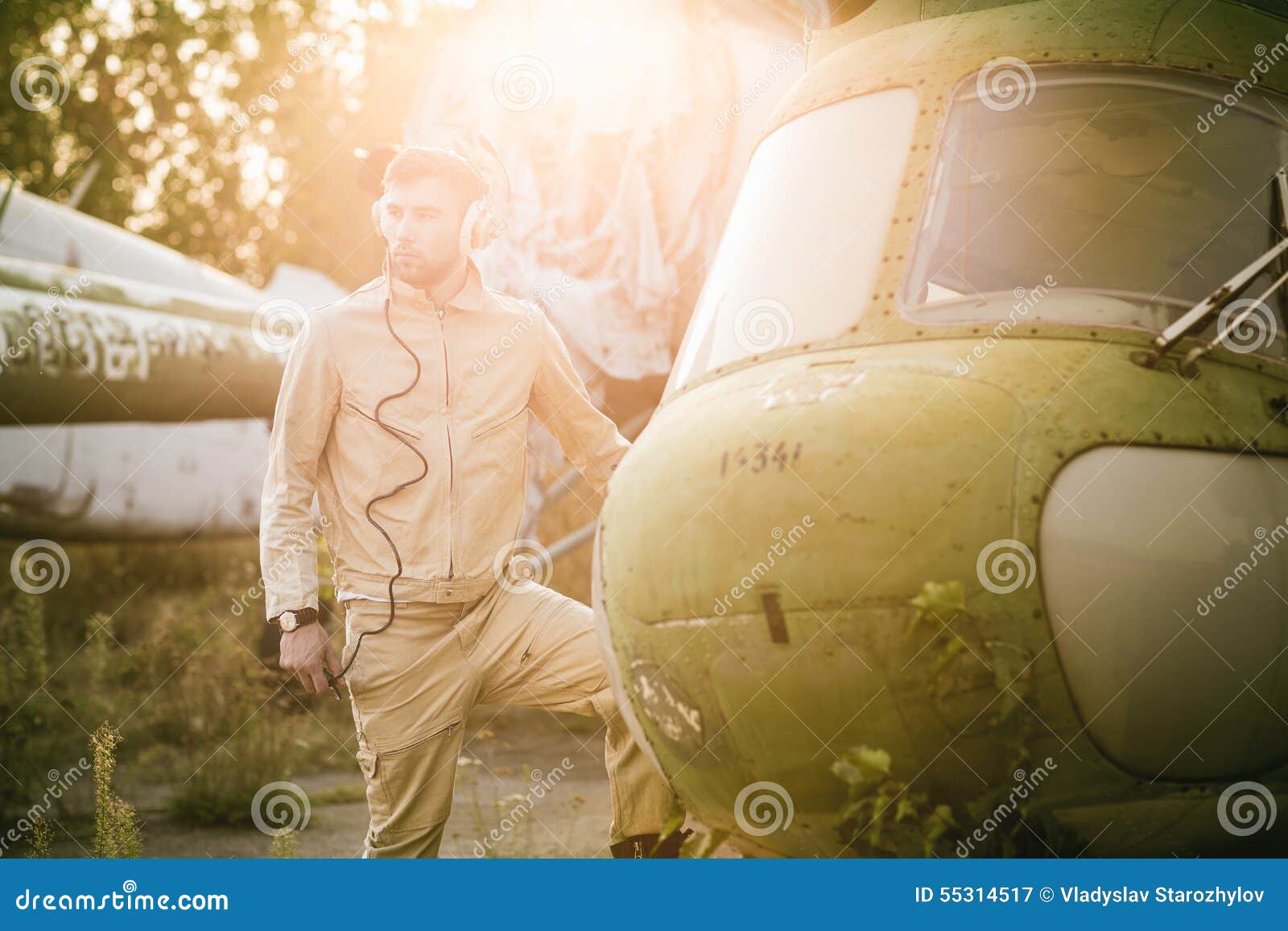 Young Pilot Posing Near the Helicopter Stock Image - Image of model ...