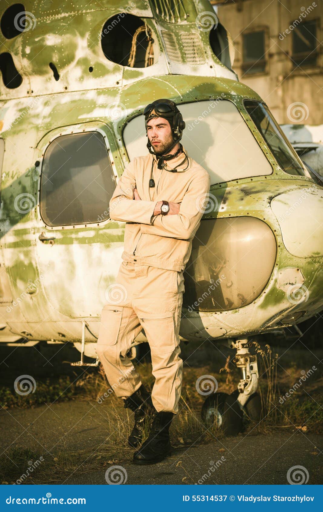 Young Pilot Posing Near the Helicopter Stock Image - Image of caucasian ...