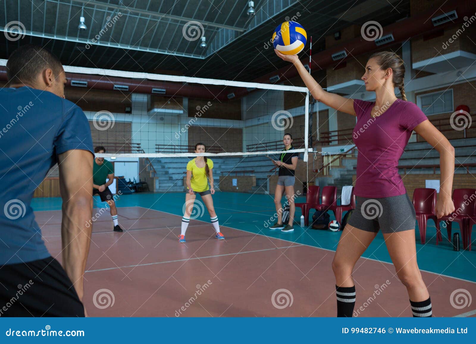 Players Practicing Volleyball Stock Photo - Image of adult, female ...