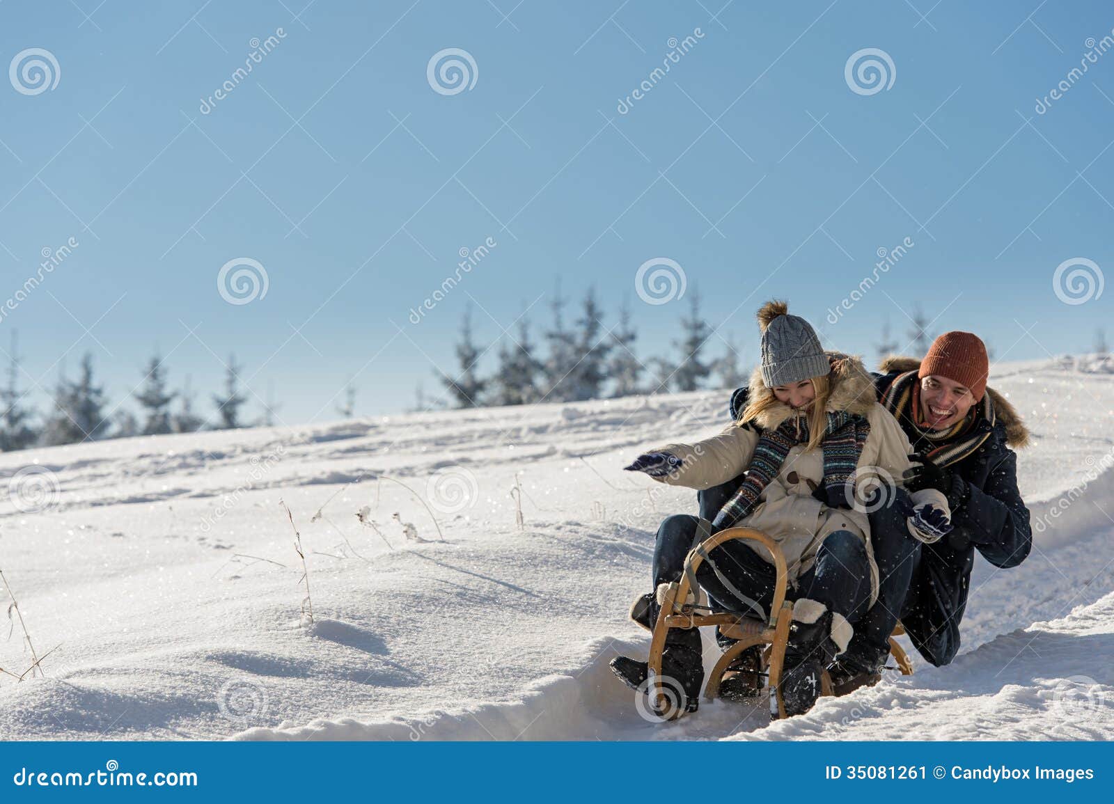 Young Playful Couple Having Fun in the Snow Stock Image - Image of ...