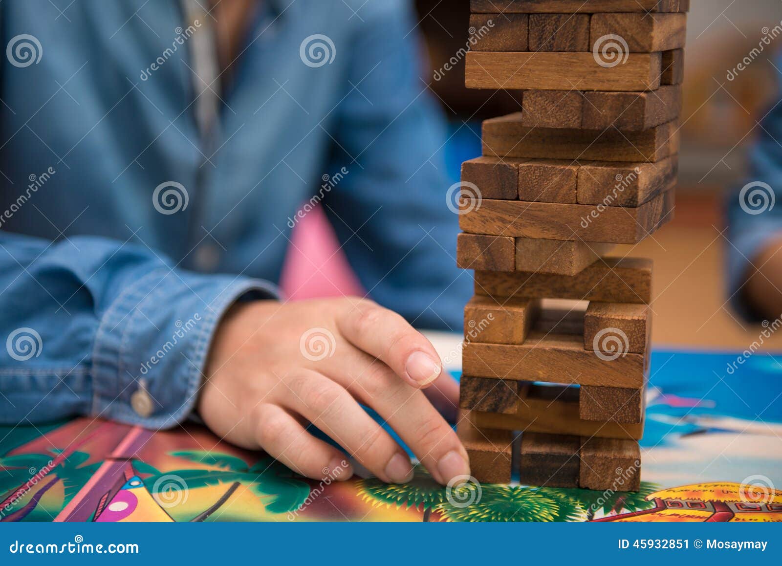 Young are Playing Jenga Wood Game Stock Image - Image of play, puzzle ...