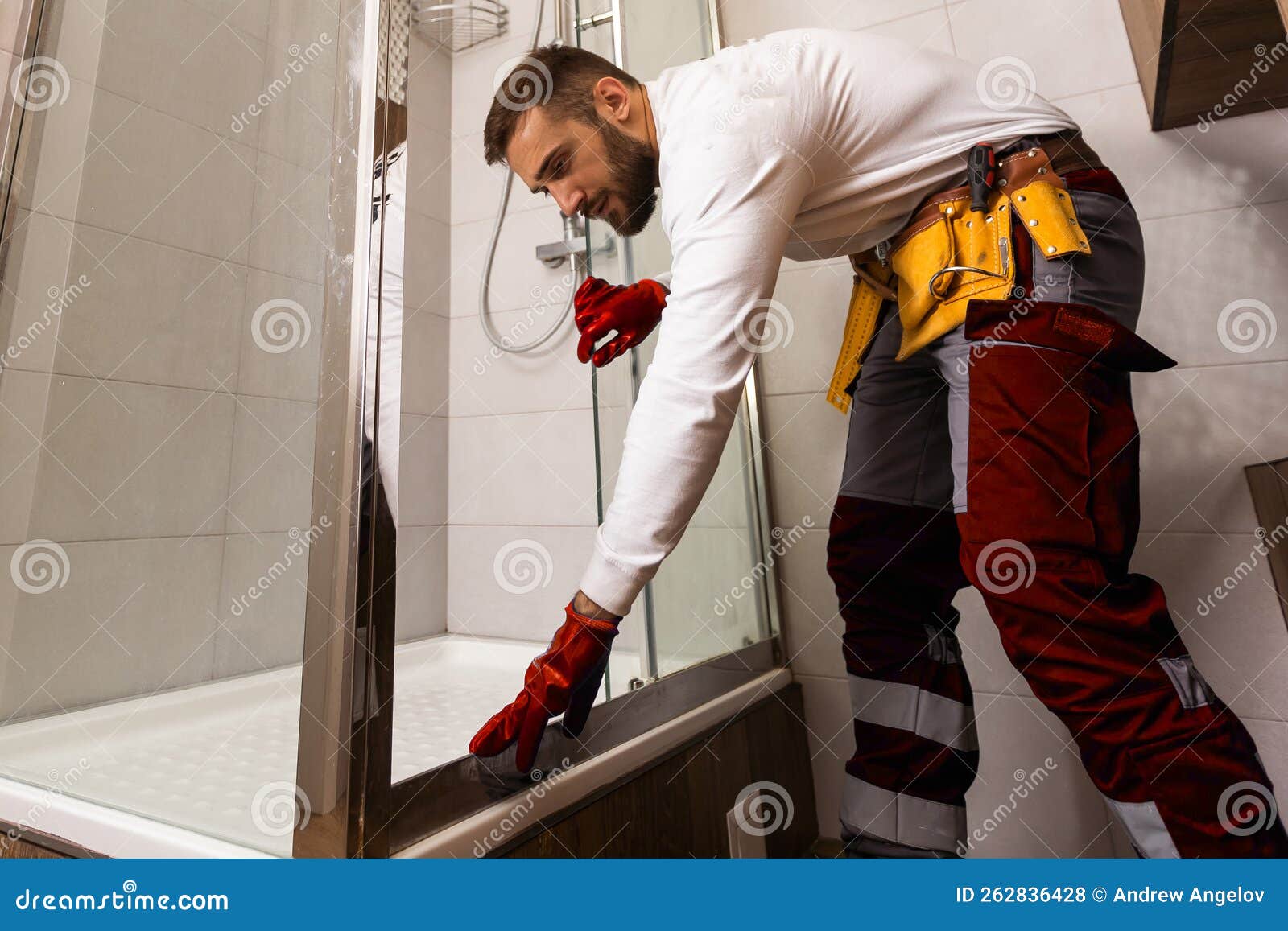 Young Plumber Fixing Shower Cabin Stock Photo - Image of bathroom ...