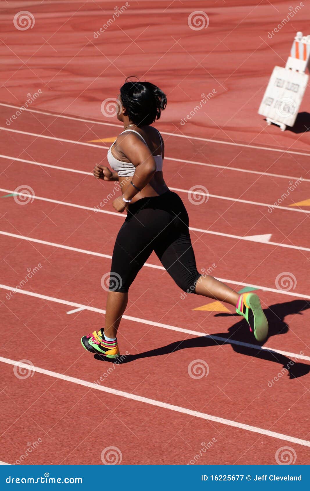 Young Plump Black Woman Running on Track Stock Image - Image of running ...