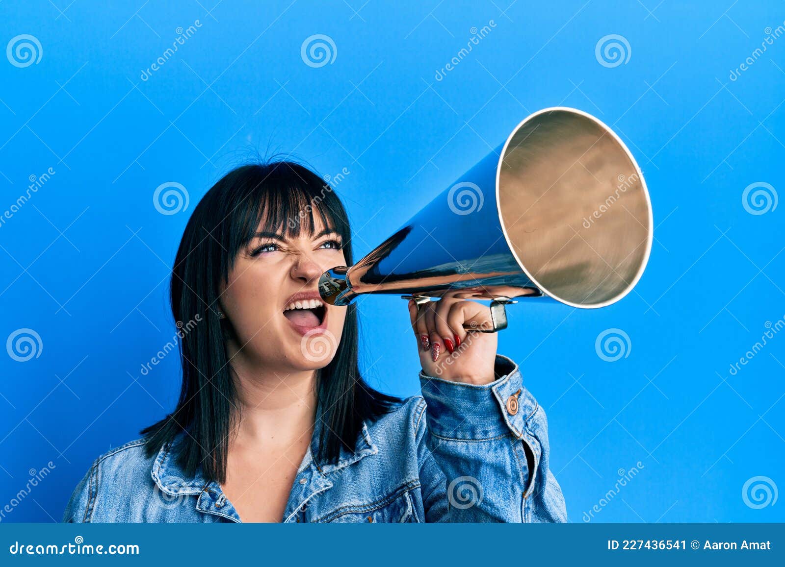 Young Plus Size Woman Shouting Using Megaphone Stock Image - Image of ...