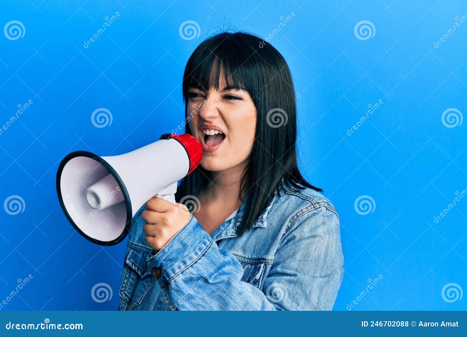 Young Plus Size Woman Shouting Using Megaphone Stock Photo - Image of ...
