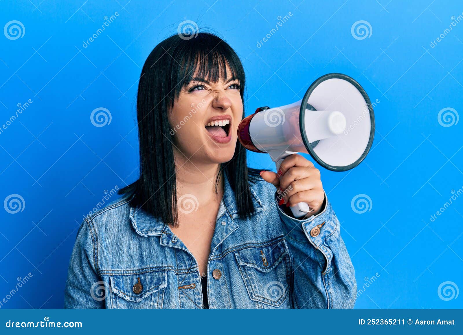 Young Plus Size Woman Shouting Using Megaphone Stock Image - Image of ...