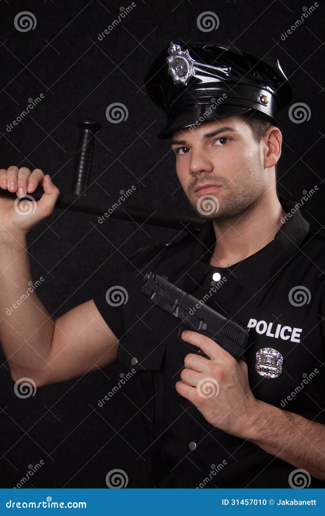 Young policeman with guns stock photo. Image of black - 31457010