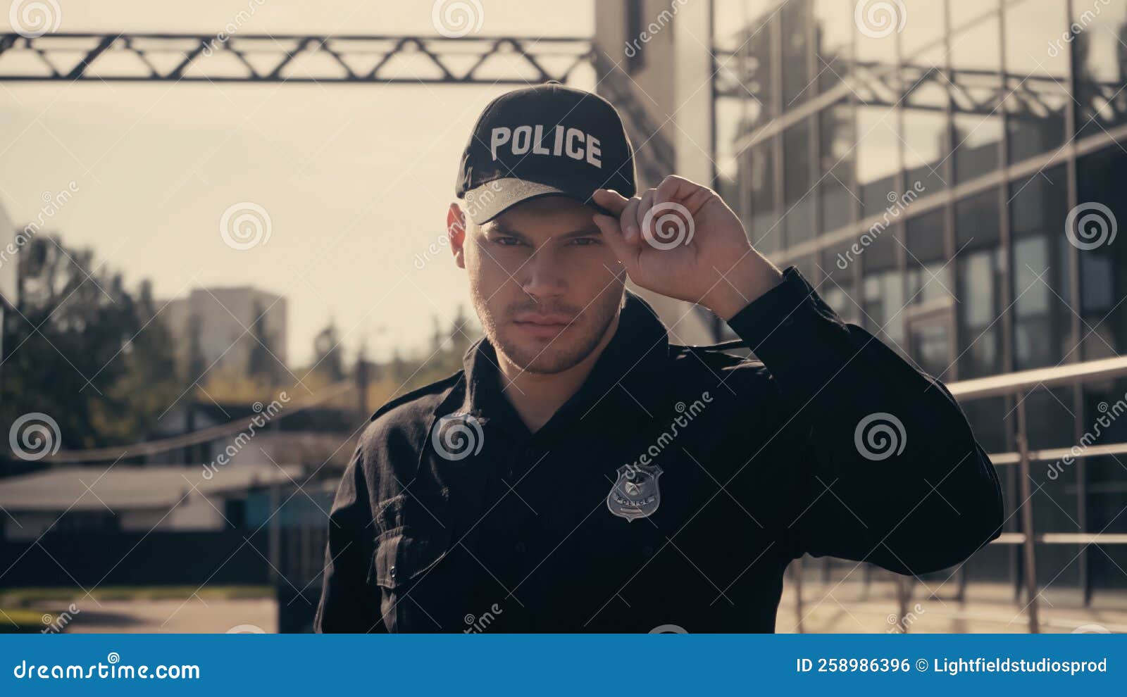 Young Policeman Looking at Camera and Stock Photo - Image of safeguard ...