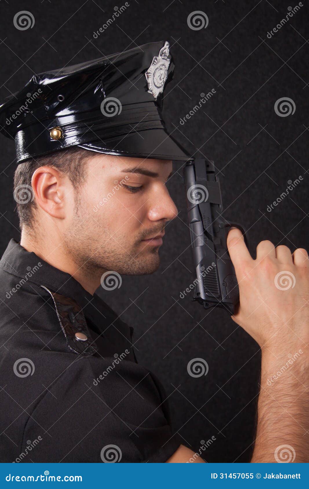 Young Policeman Looking Down Stock Image - Image of policeman, weapon ...