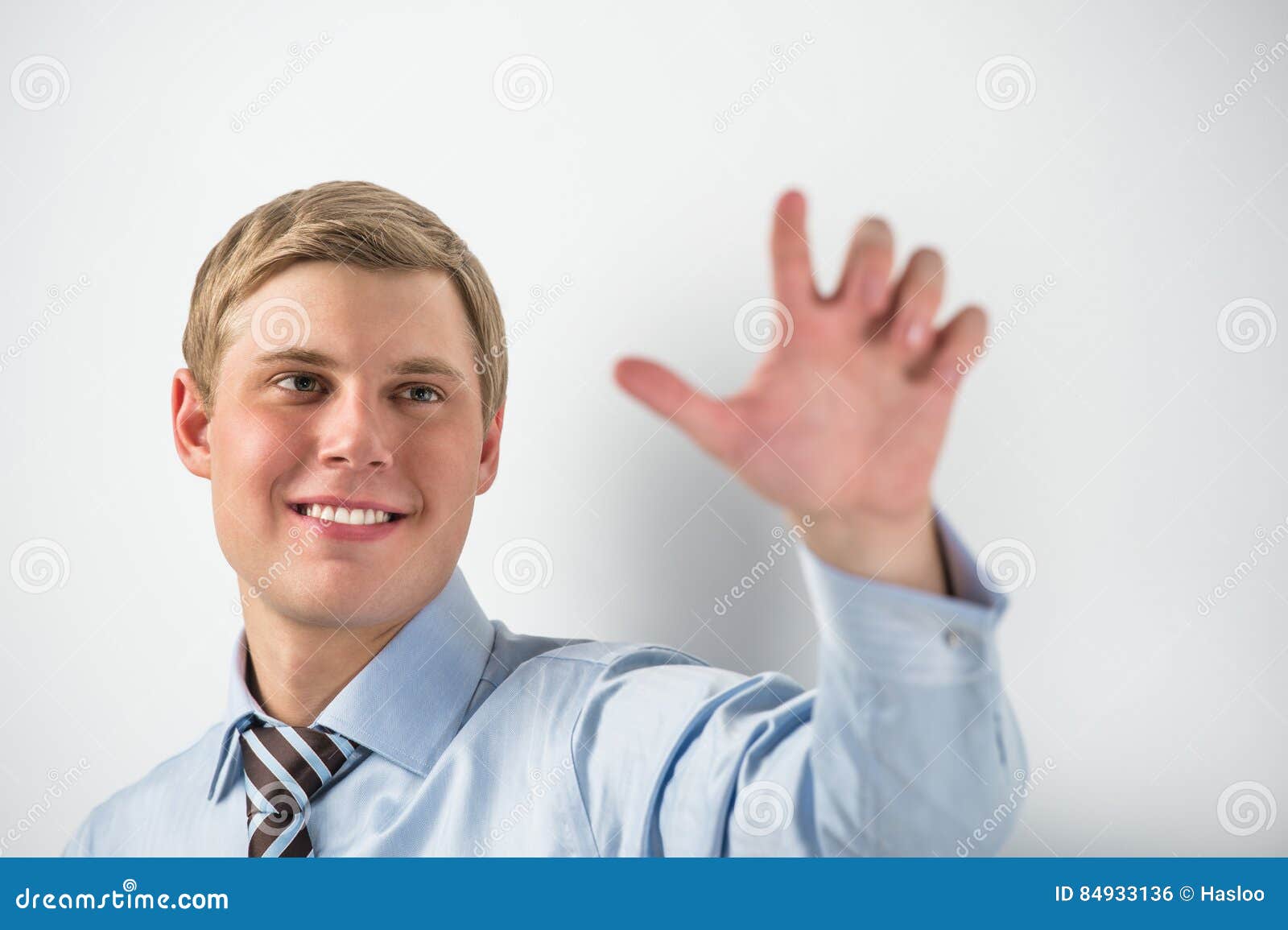 Young Positive Business Man Touching Virtual Button. Editable Image ...