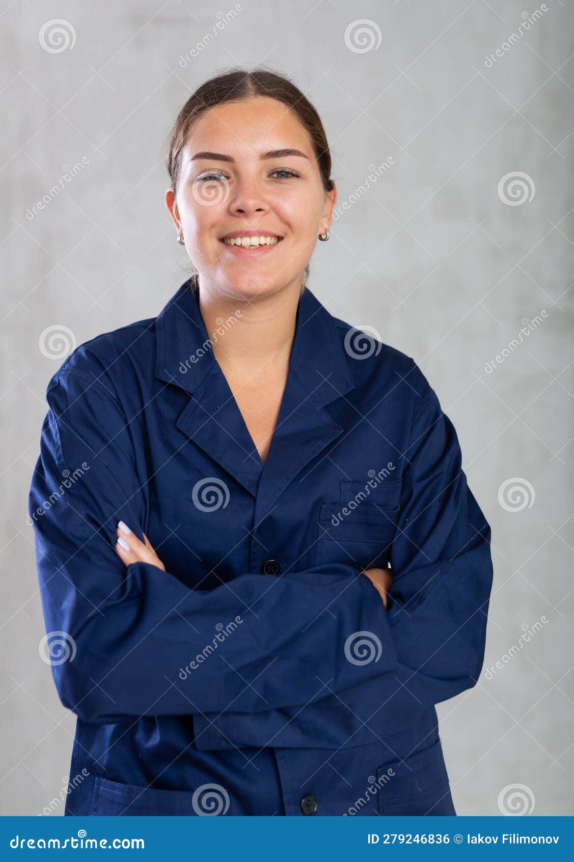Young Woman Posing in Working Uniform in Studio Stock Photo - Image of ...
