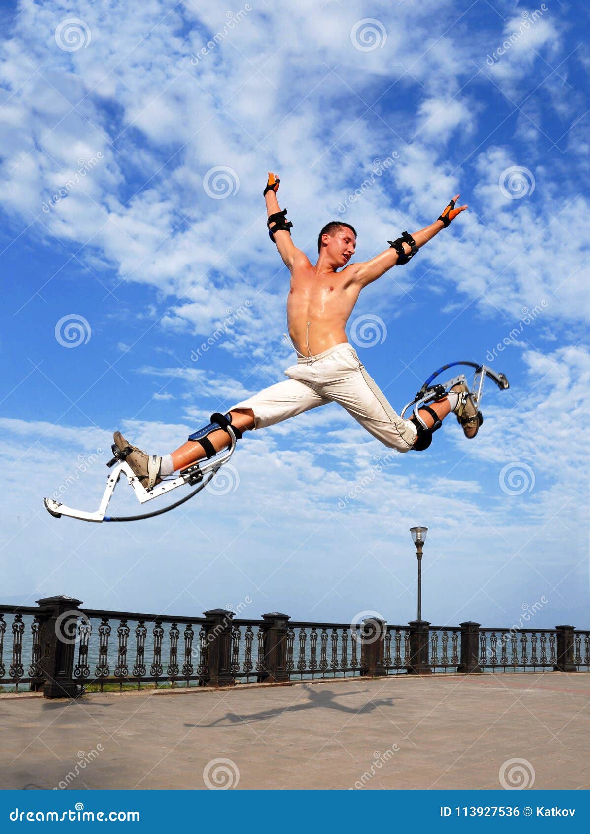 Young Power Jumper with Stilts Stock Photo - Image of cityscape, jump ...