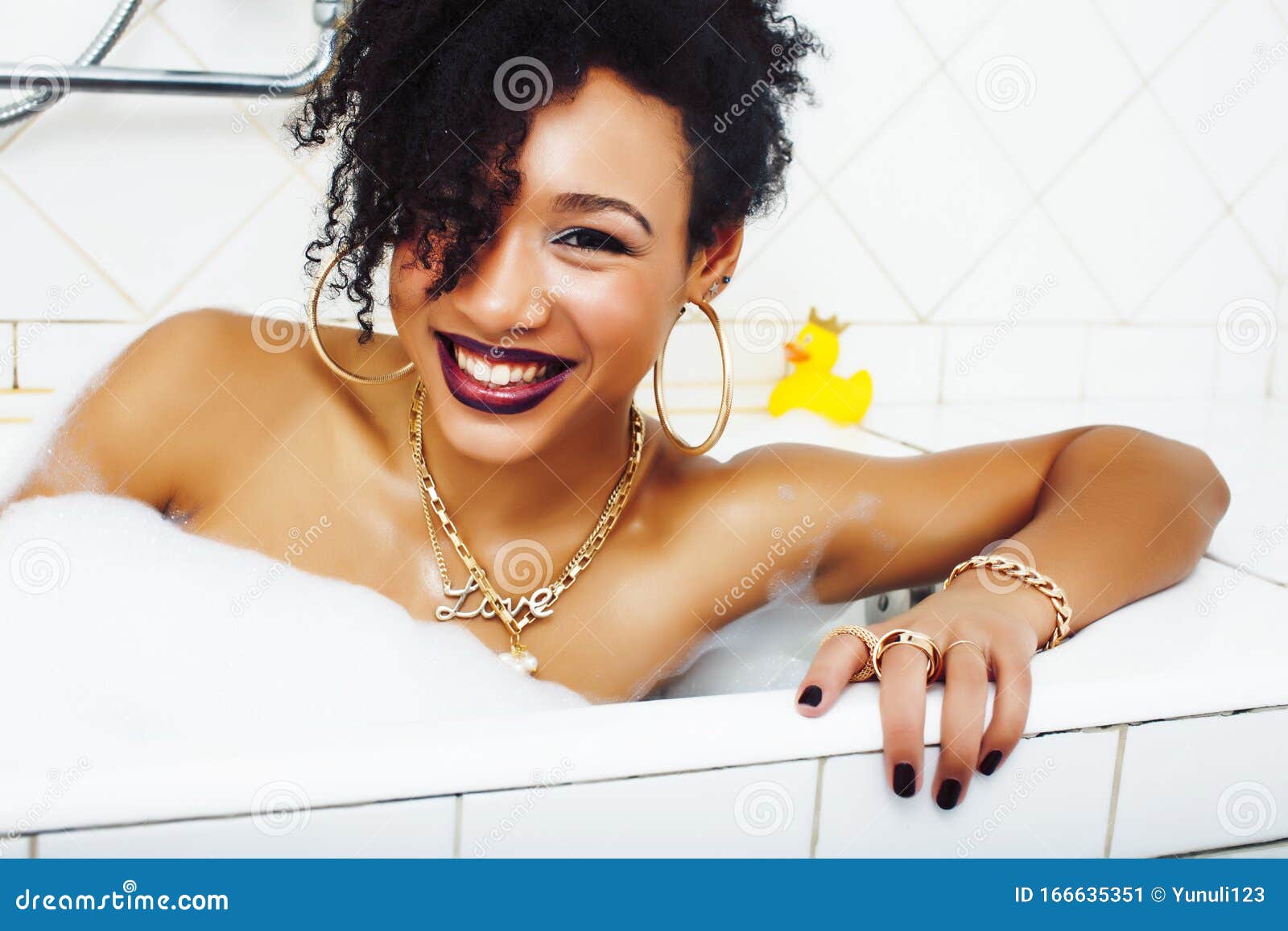 Young Pretty African American Girl Taking Bath With Foam Happy Smiling