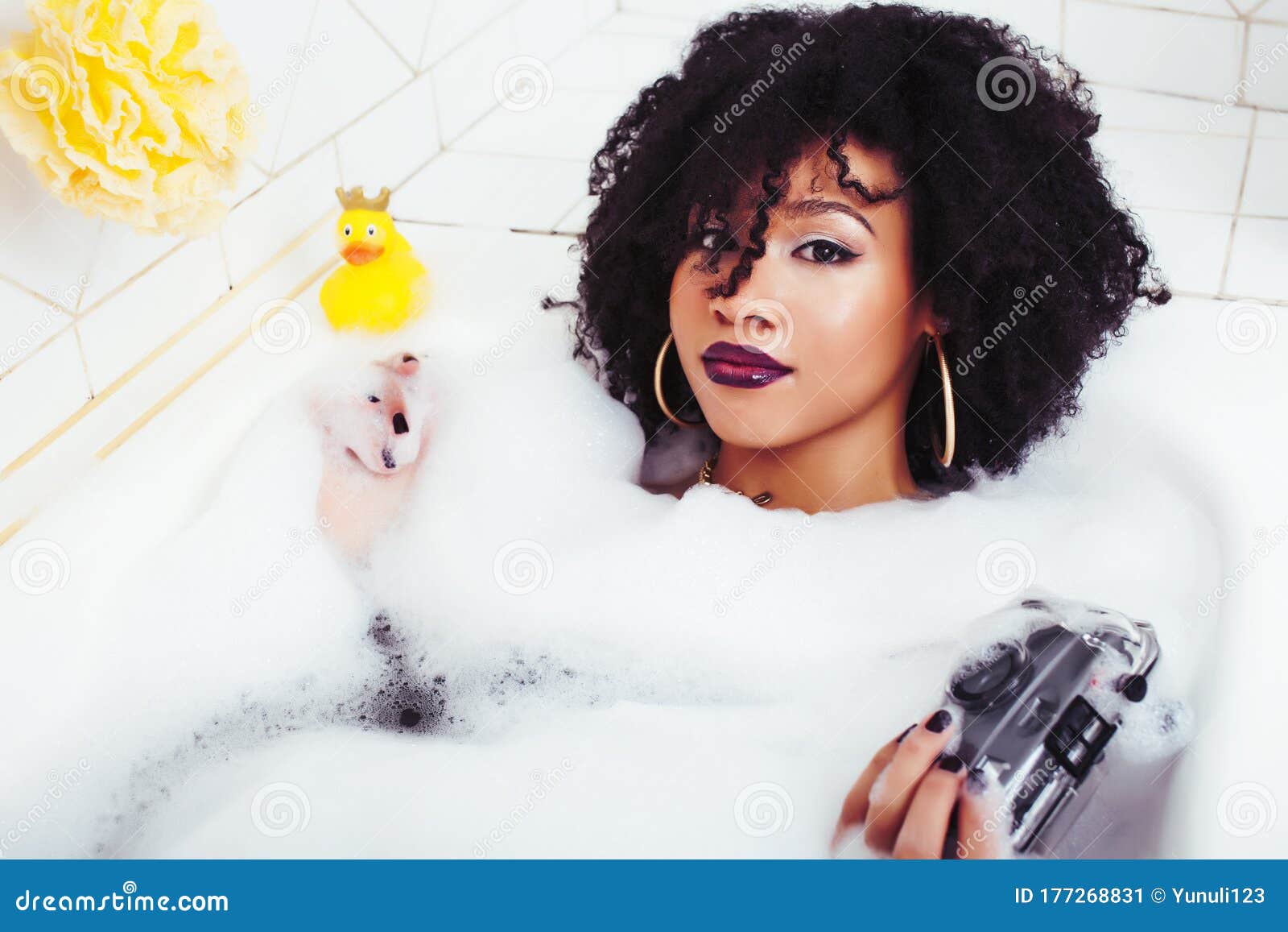 Young Pretty African American Girl Taking Bath With Foam Lifestyle