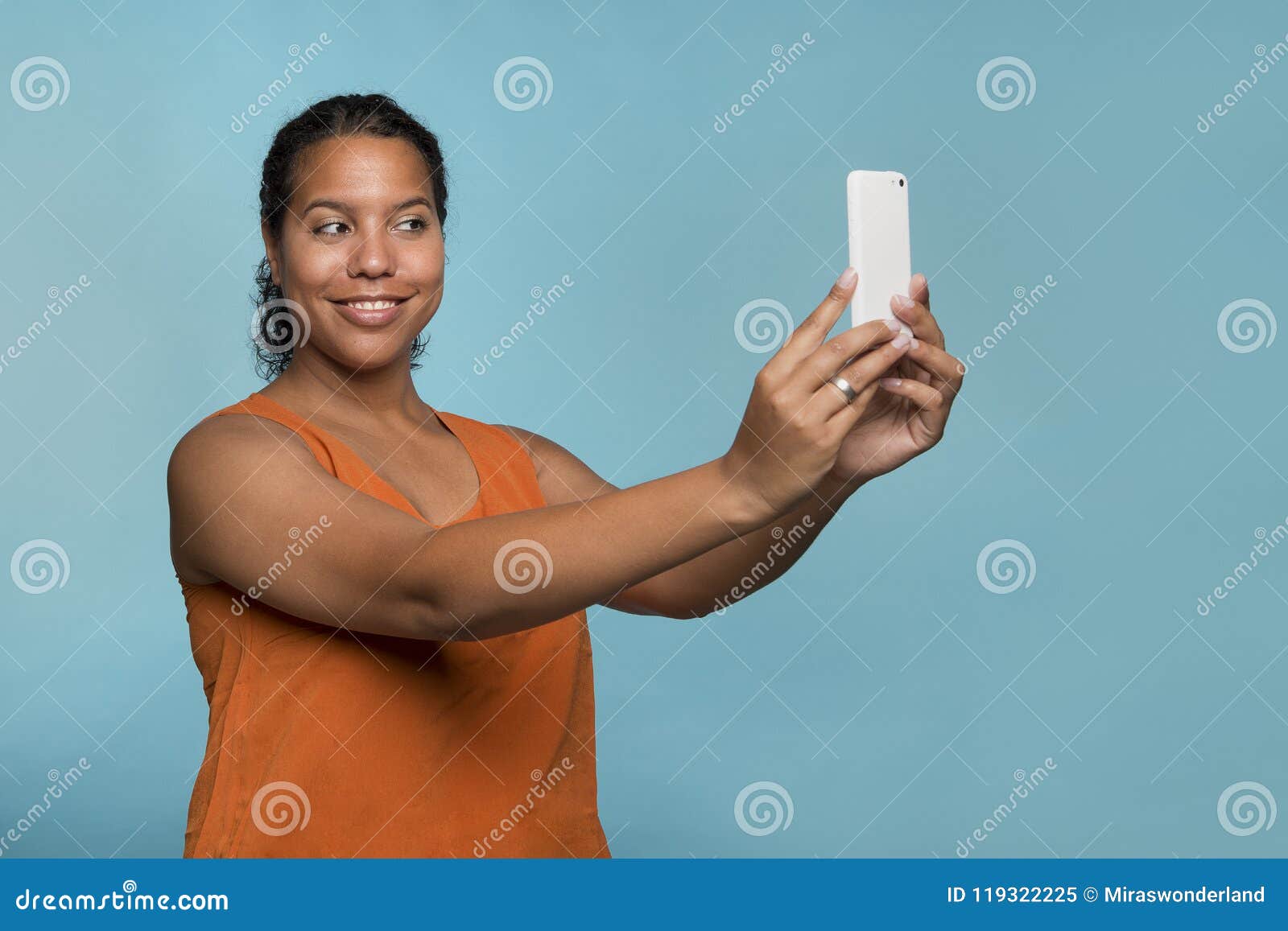 Young Pretty Black Woman Taking A Selfie With A Mobile Phone On Stock