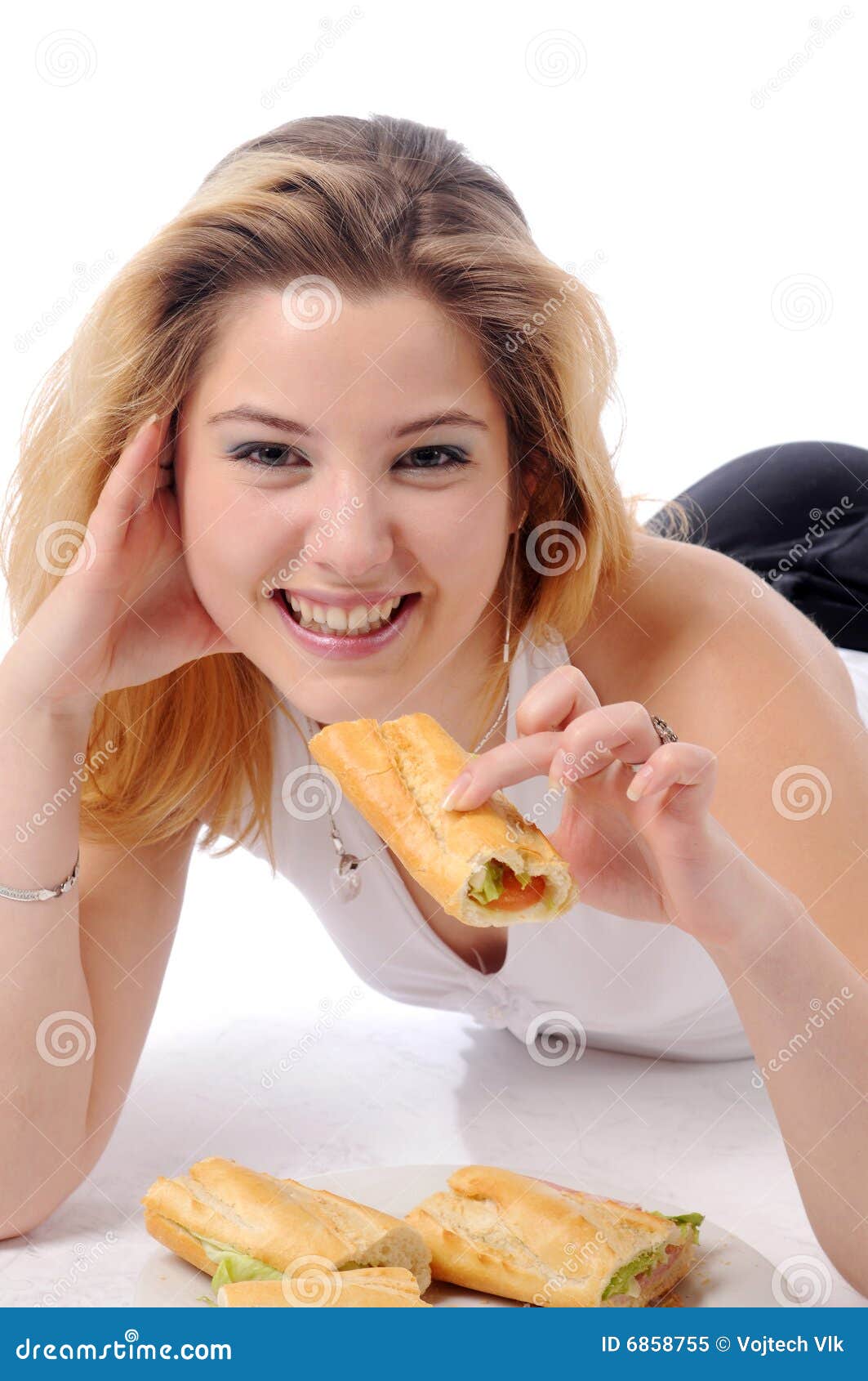 Young pretty eating girl stock image. Image of white, beautiful - 6858755