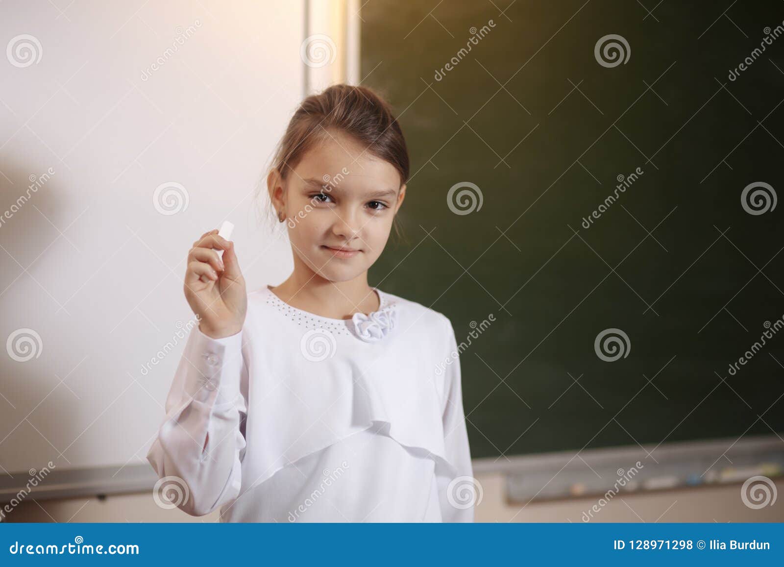 Young Pretty Female Tutor Using Stick Teaching Study Class and Standing ...