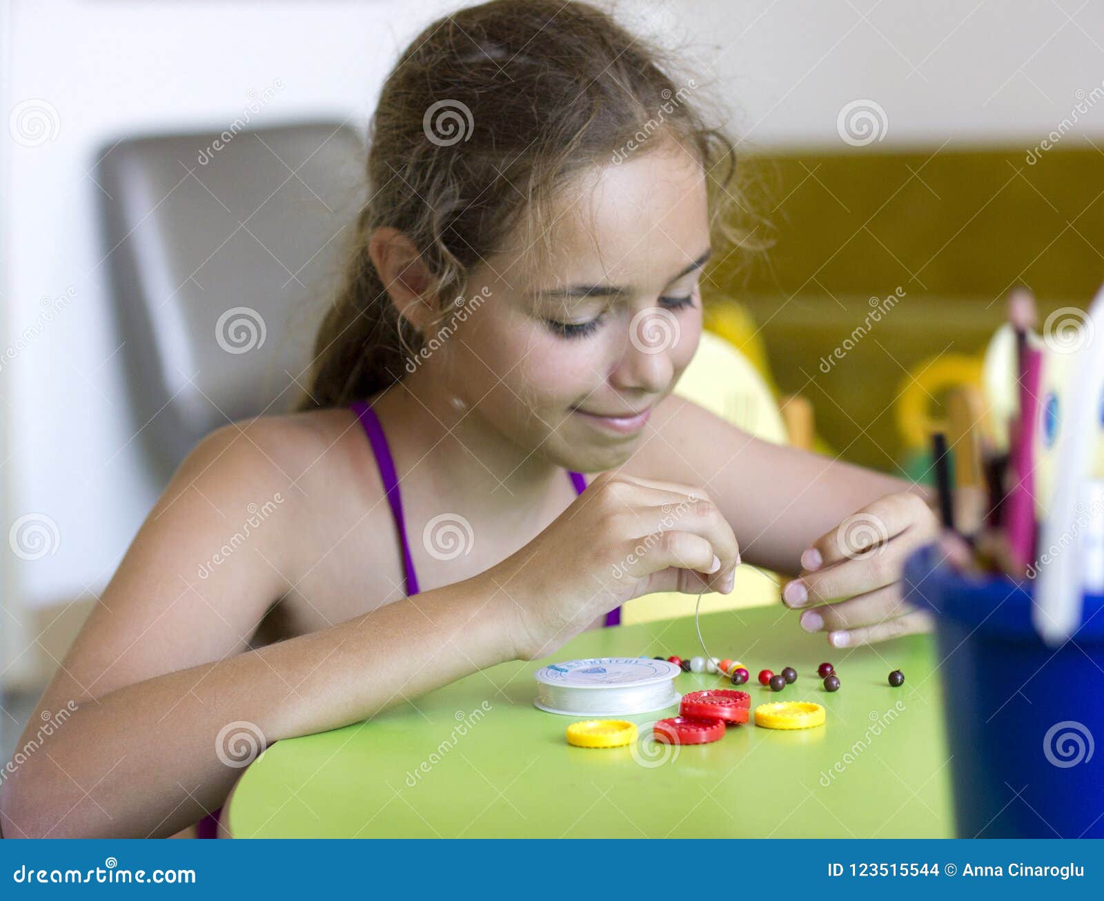 Young Pretty Girl with Needlework, Stringing Beads on a String Stock ...