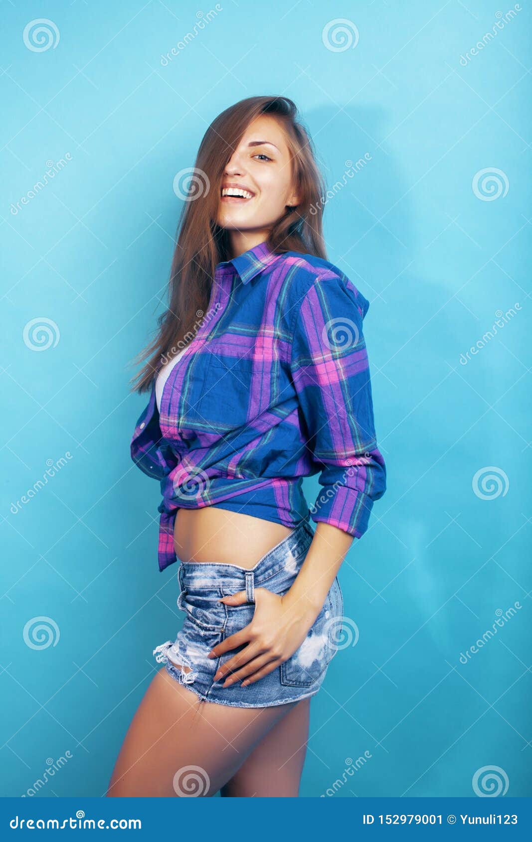 Young Pretty Girl Posing Happy Smiling On Blue Background Lifestyle