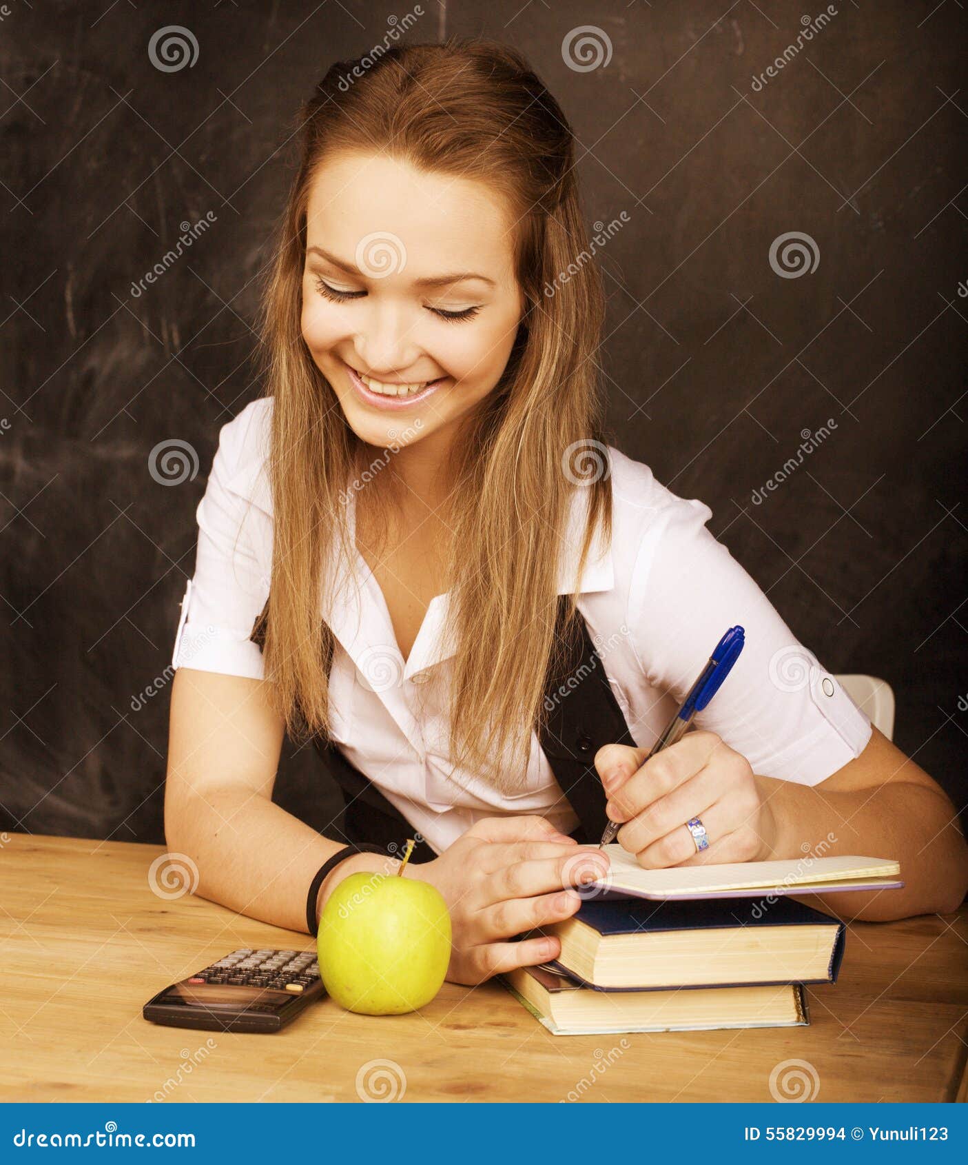 Young Pretty Girl Student in Classroom at Stock Photo - Image of ...