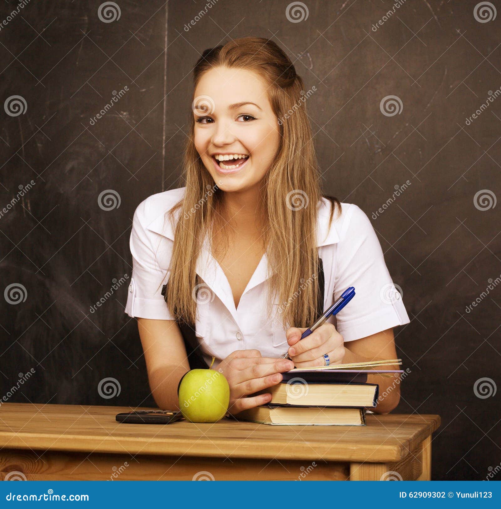 Young Pretty Girl Student in Classroom at Stock Photo - Image of female ...