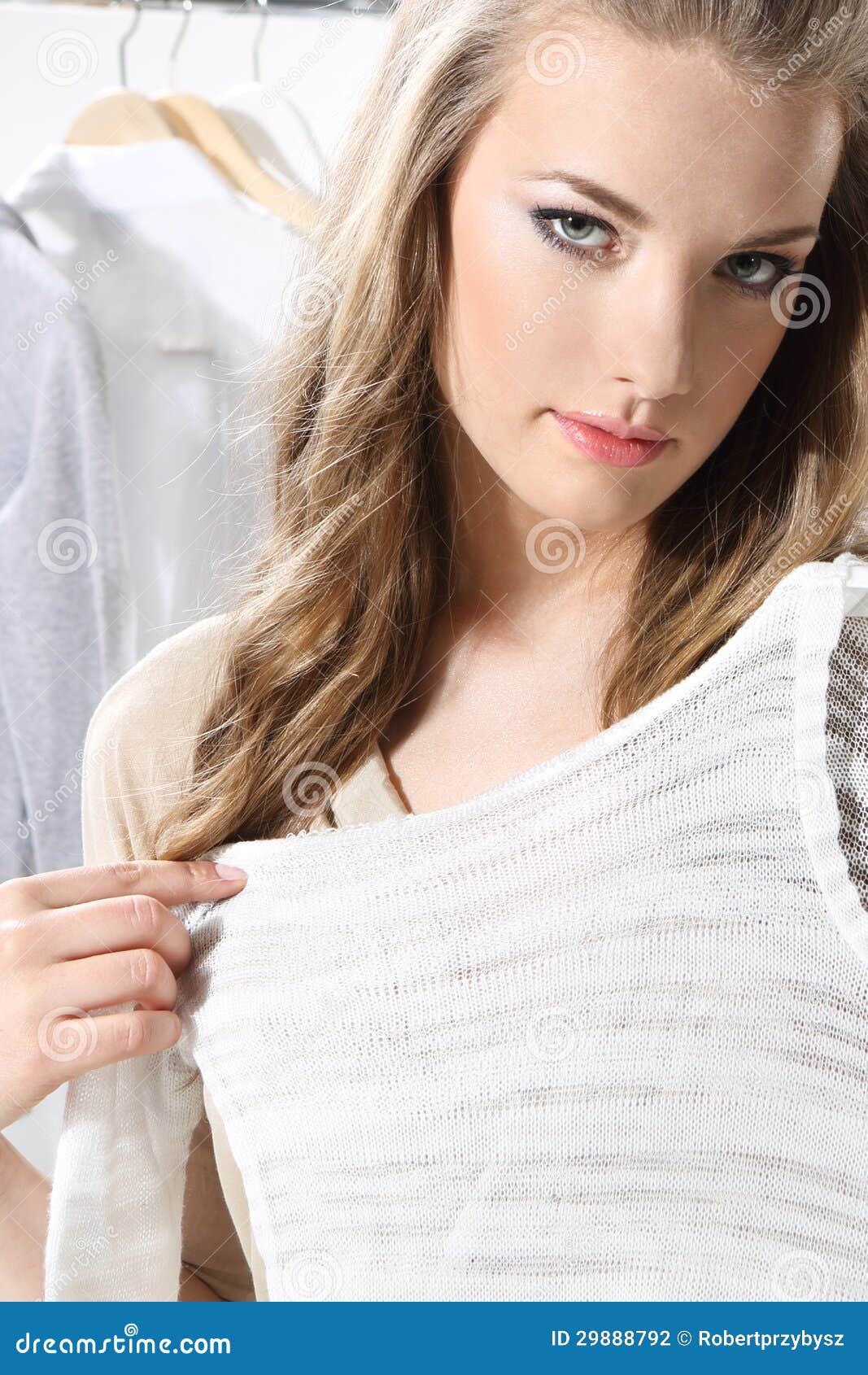 Pretty Girl Trying on Clothes Stock Photo - Image of lovely, caucasian ...
