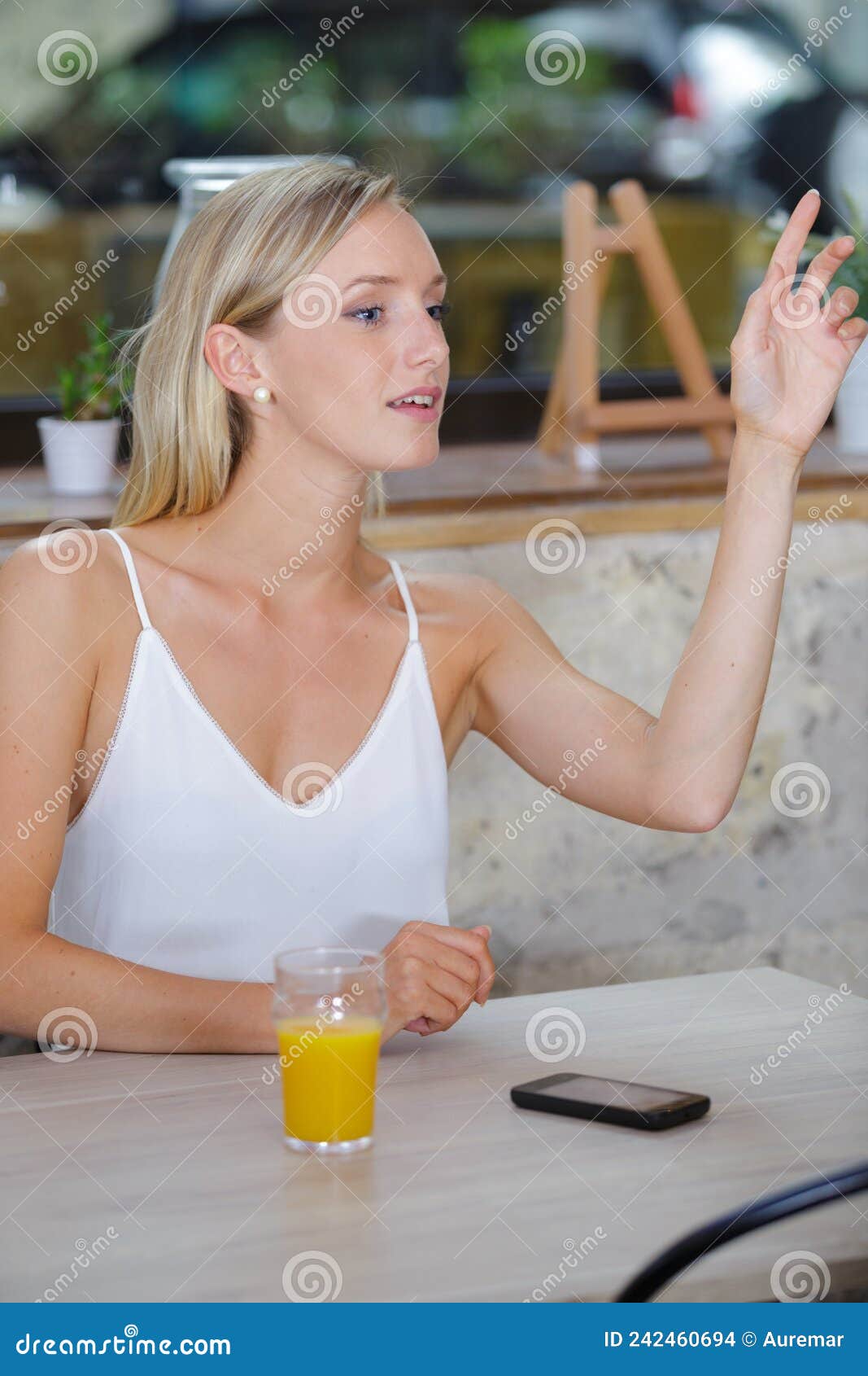 Young Pretty Lady Ordering Something Stock Photo - Image of display ...