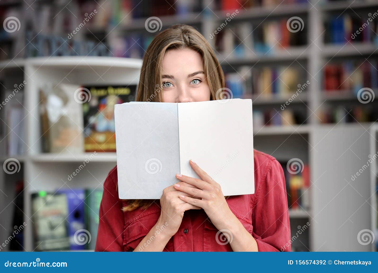 Young Pretty Woman with Book in Stock Photo - Image of encyclopedia ...