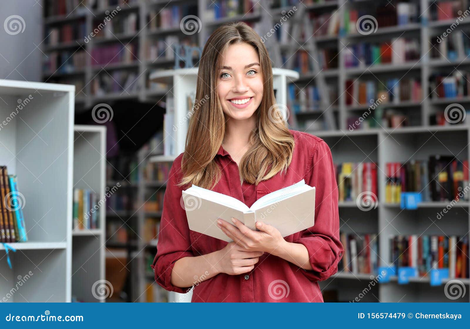 Young Pretty Woman with Book in Stock Image - Image of encyclopedia ...