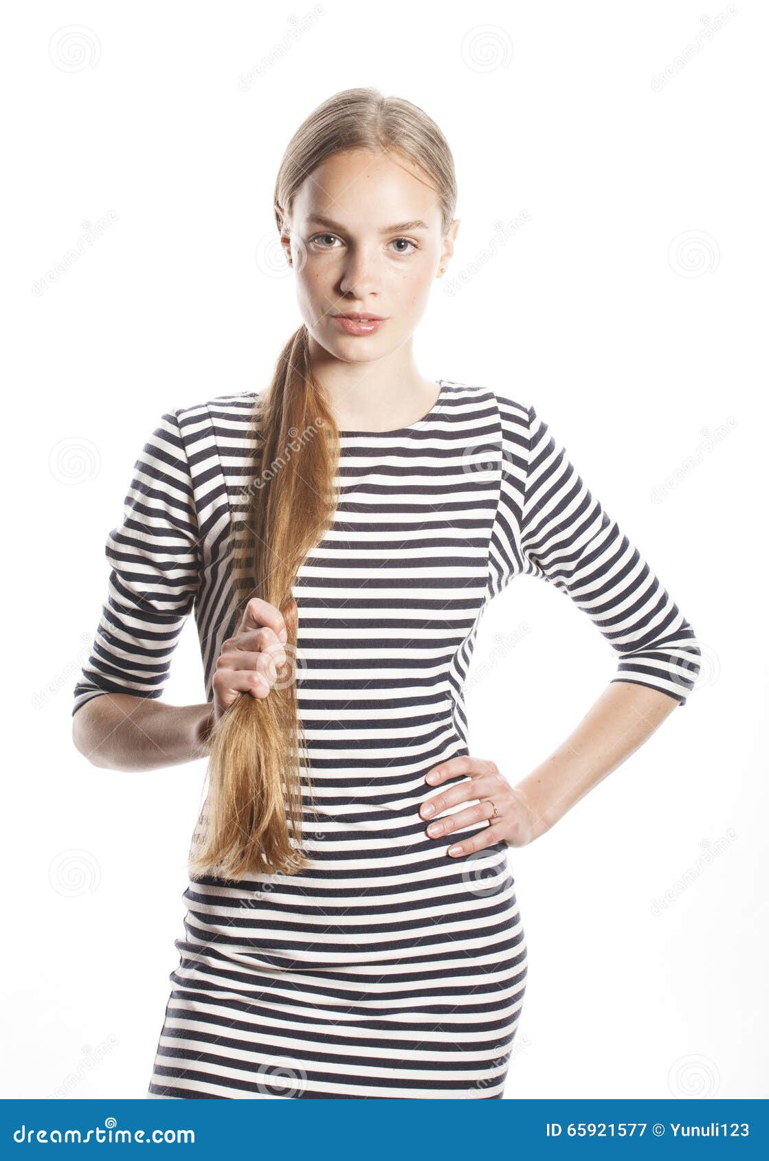 Young Pretty Woman In Elegant Strip Dress Isolated On White Stock Image
