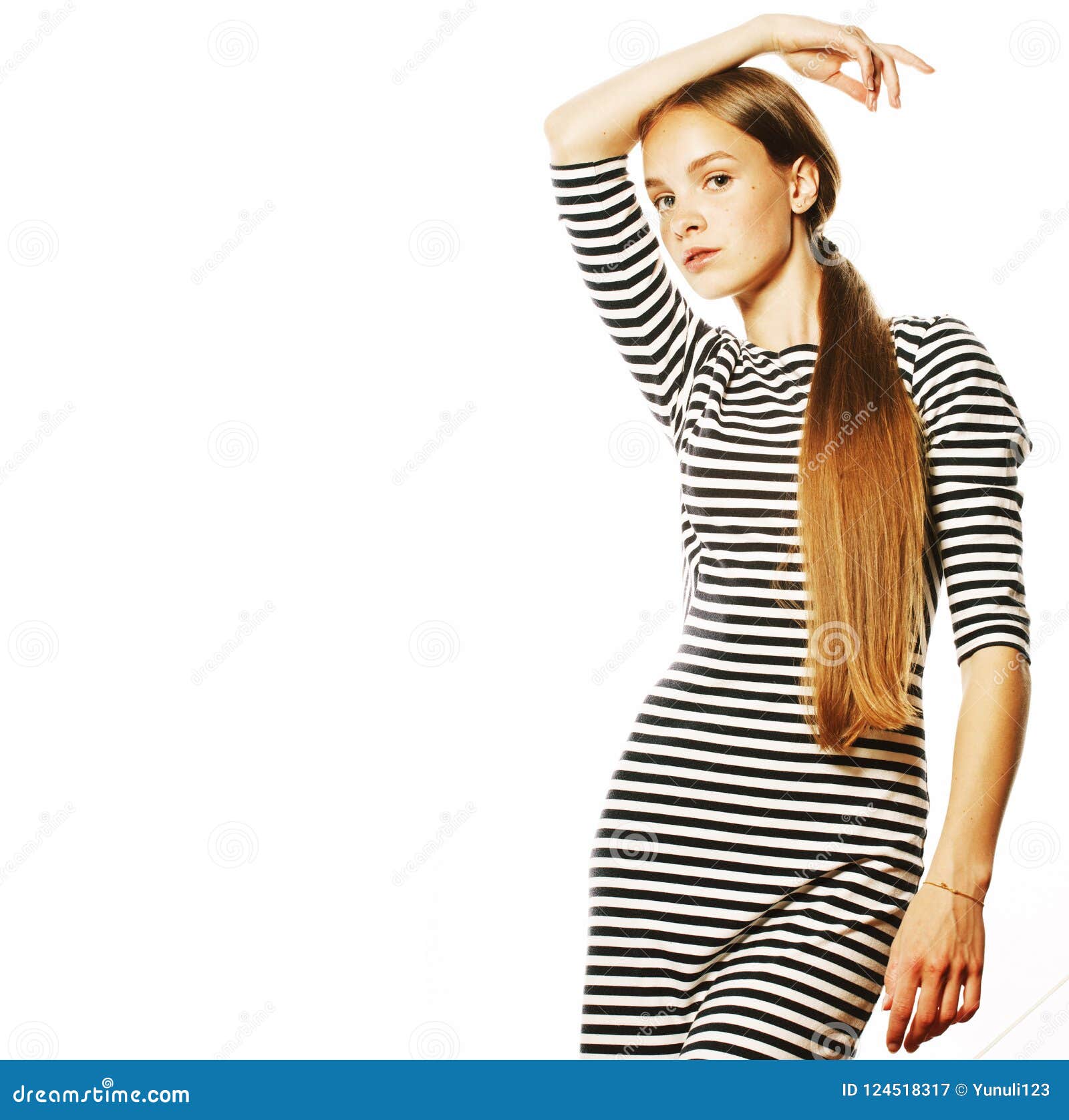 Young Pretty Woman In Elegant Strip Dress Isolated On White Stock Image