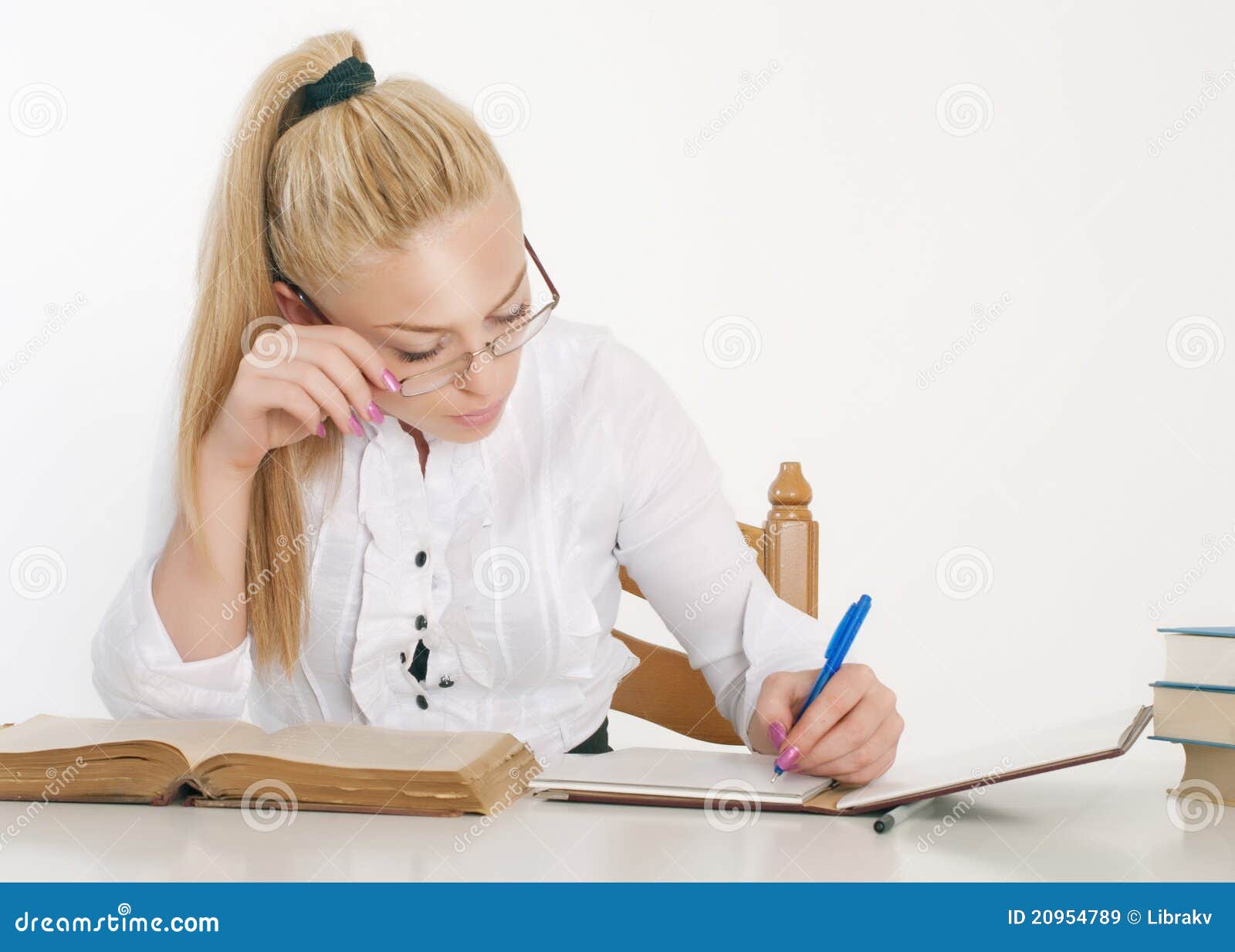 Young Pretty Woman Learning at Table Stock Image - Image of hair, alone ...