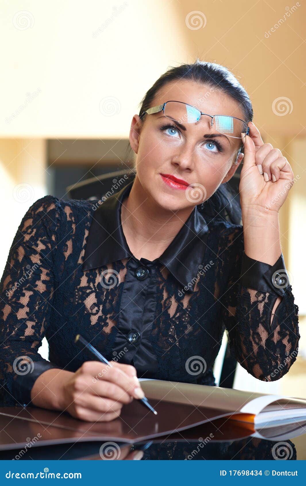 Young Pretty Woman Sitting at a Table Stock Photo - Image of homework ...