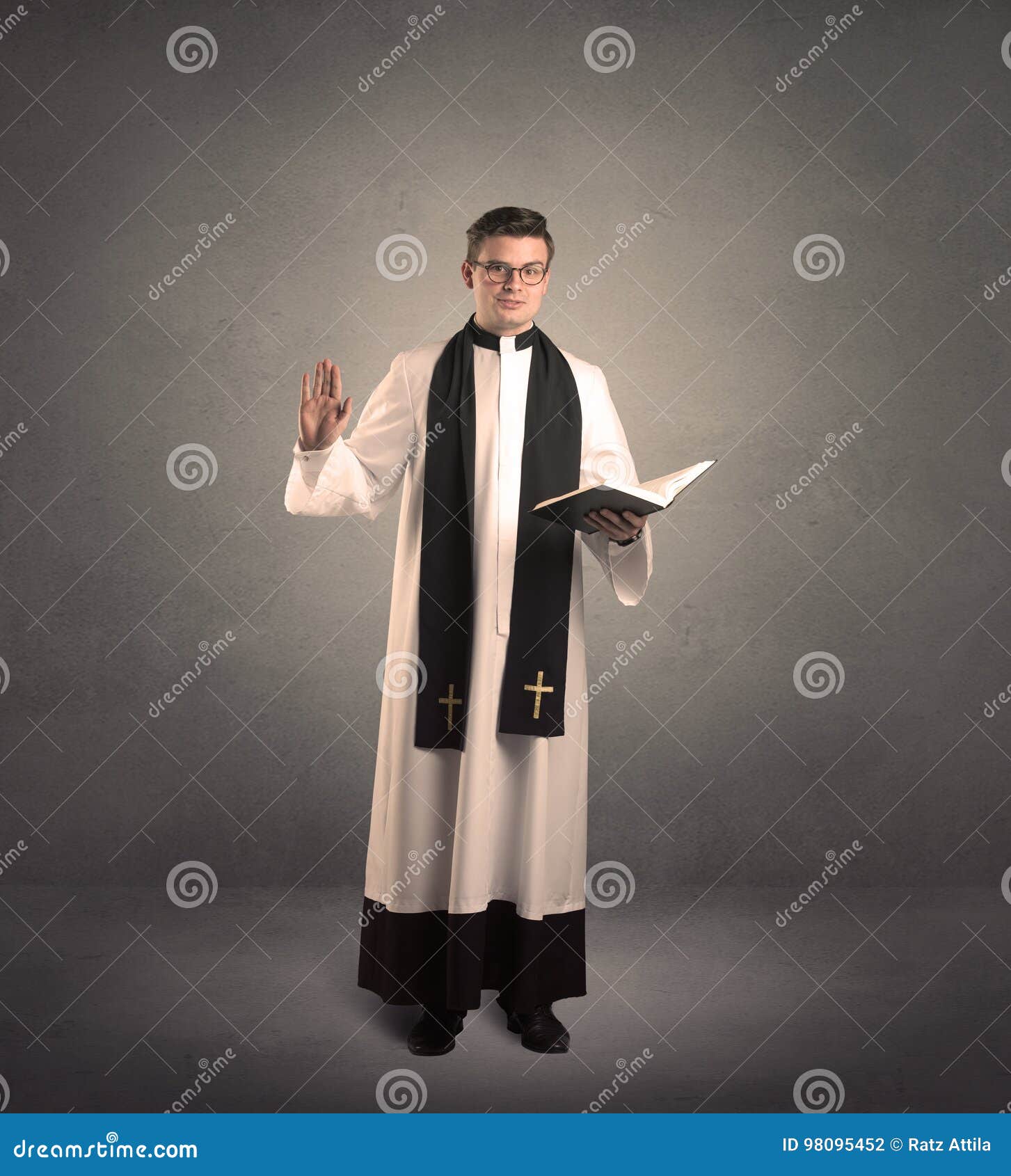 Young Priest in Giving His Blessing Stock Photo - Image of book ...