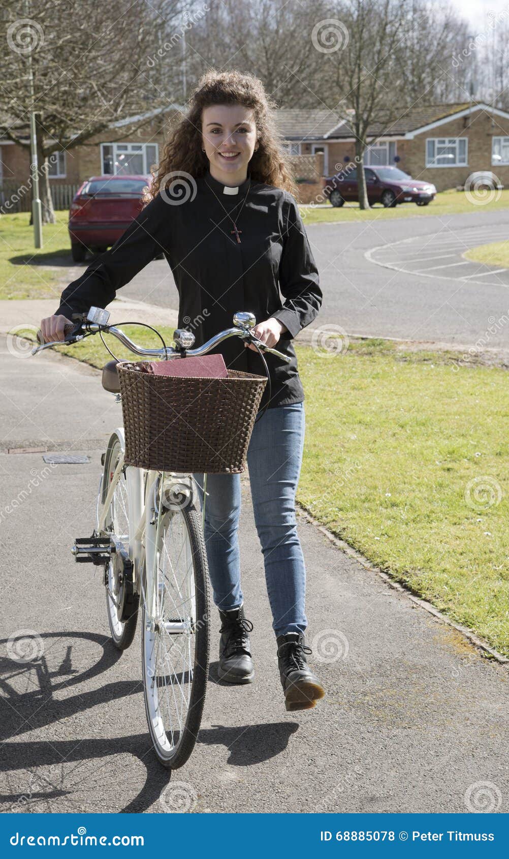 Young Priest Using a Bicycle To Visit Her Parish Stock Photo - Image of ...