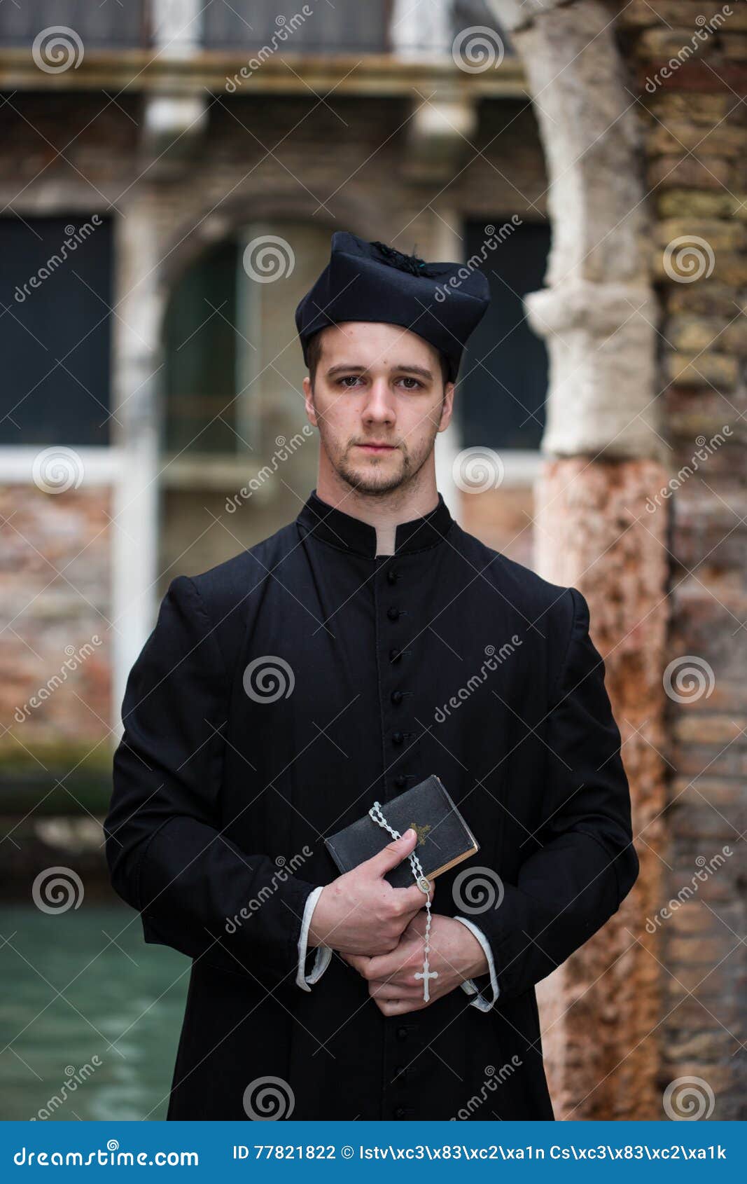 Young priest in venice stock photo. Image of mantle, pray - 77821822