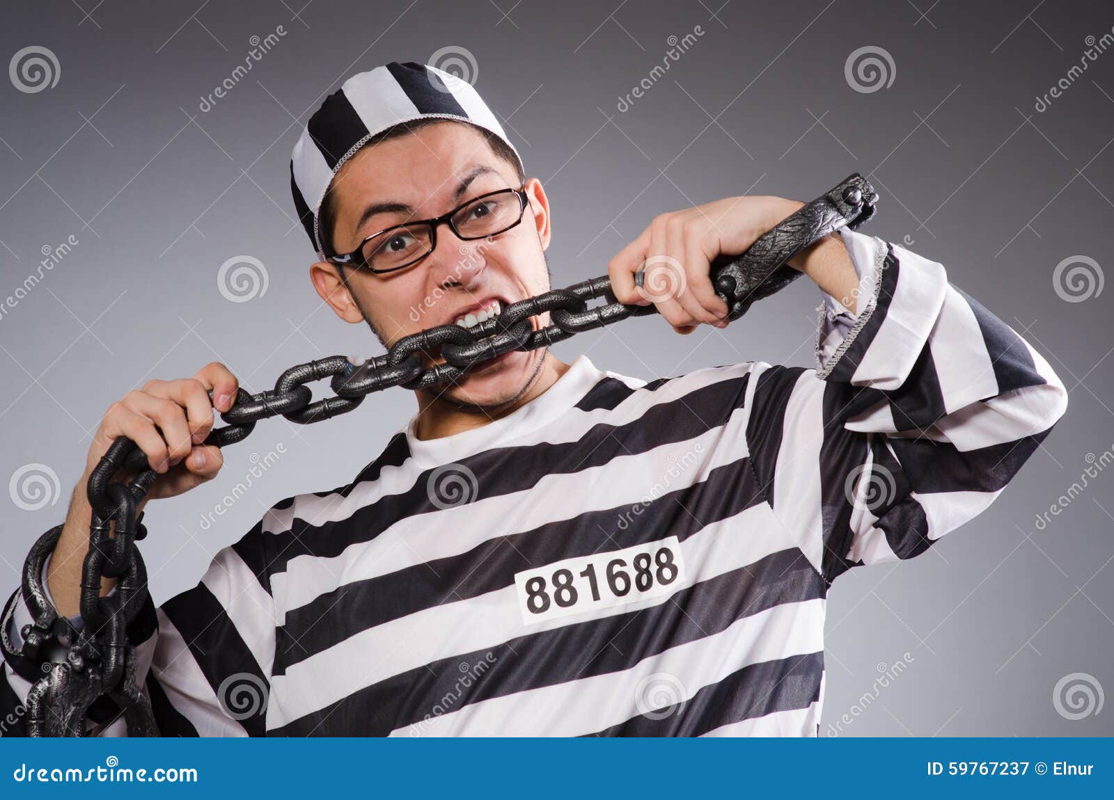 Young Prisoner in Chains Against Gray Stock Image - Image of aggressive ...
