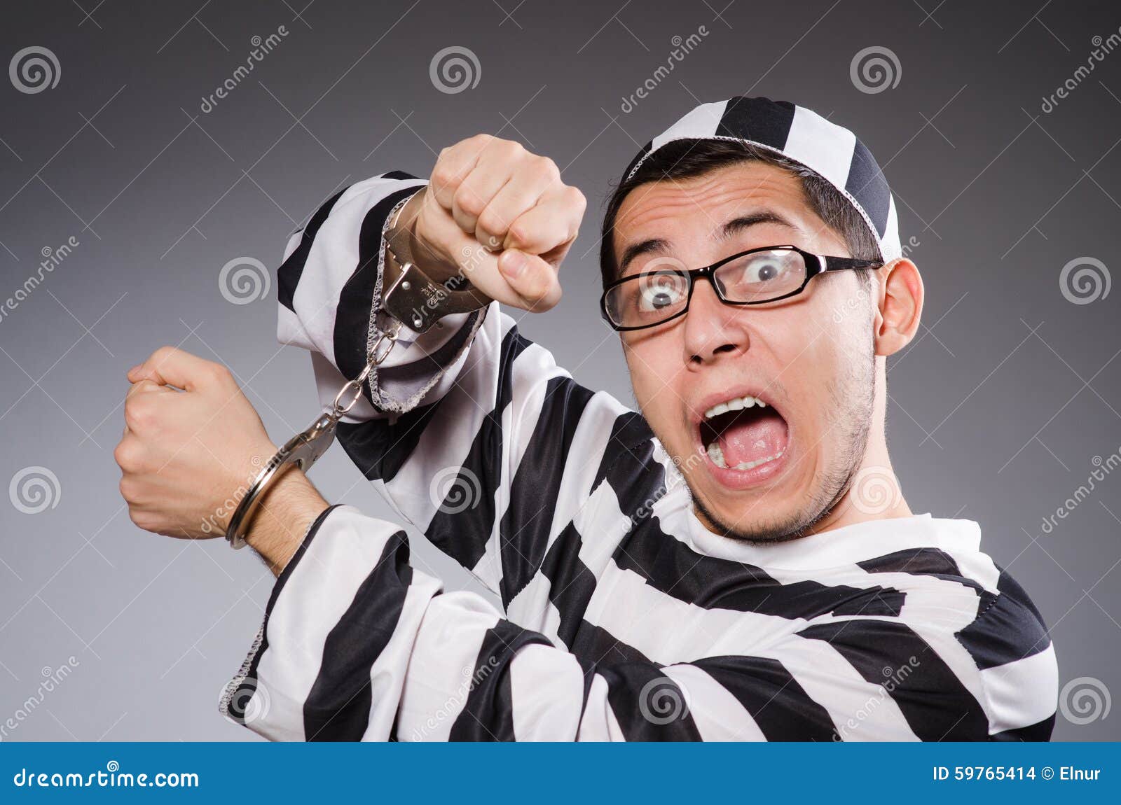 Young Prisoner in Handcuffs Against Gray Stock Photo - Image of inmate ...