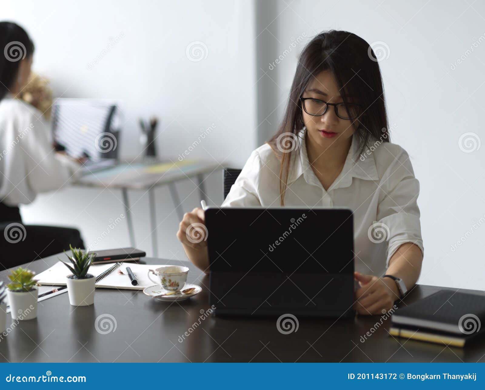 Businesswoman Concentrate on Her Work while Working with Tablet Stock ...