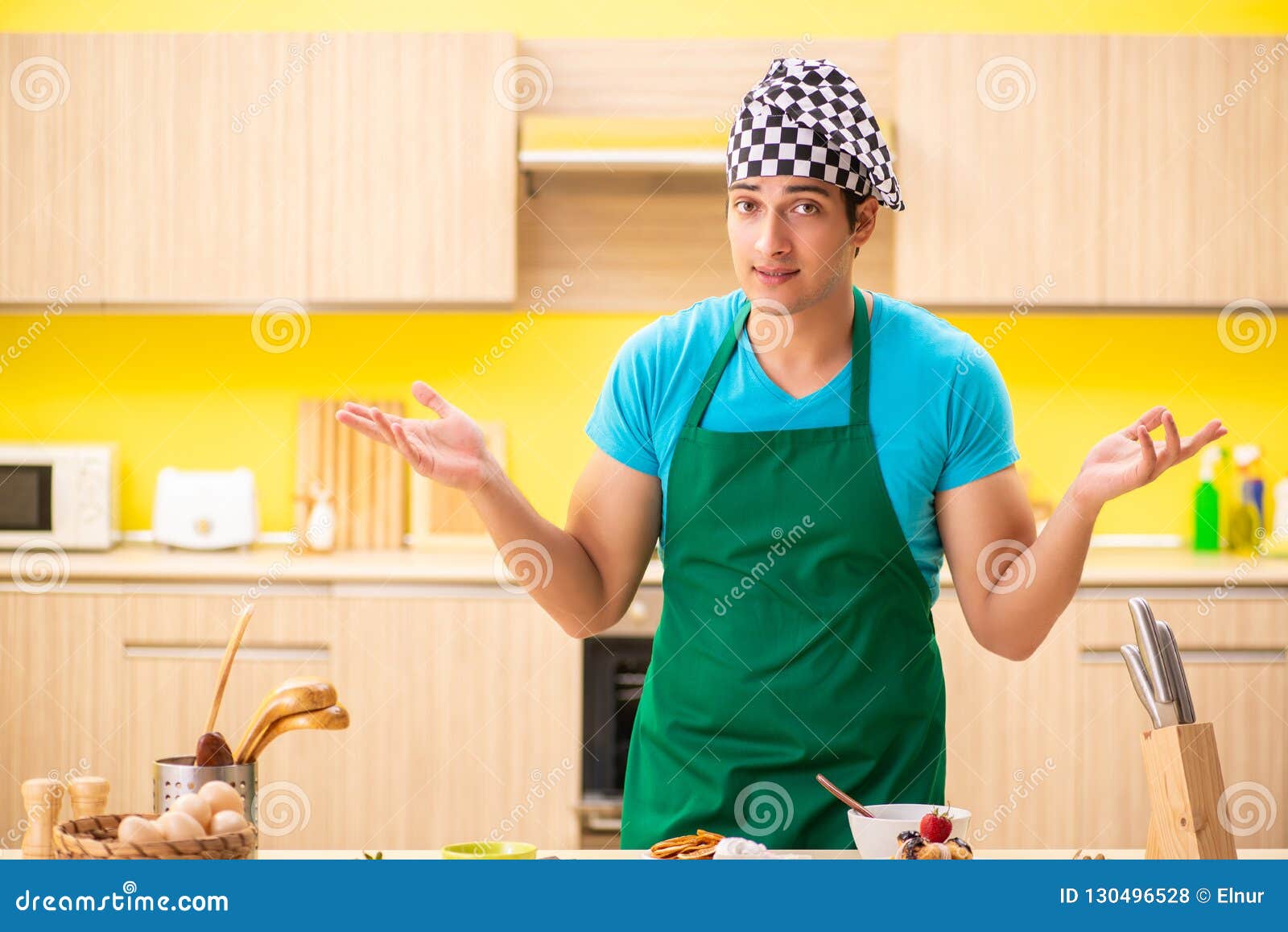 The Young Professional Cook Preparing in Kitchen Stock Photo - Image of ...