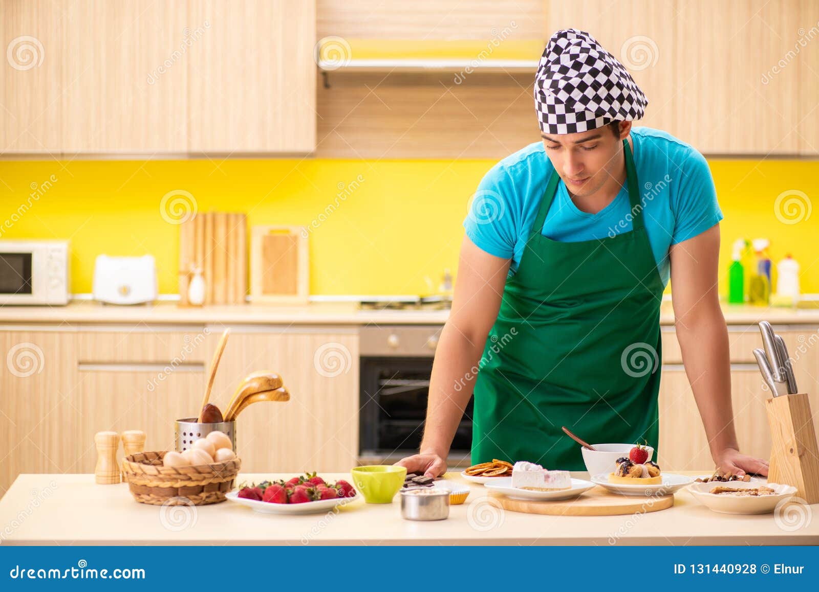 The Young Professional Cook Preparing in Kitchen Stock Photo - Image of ...