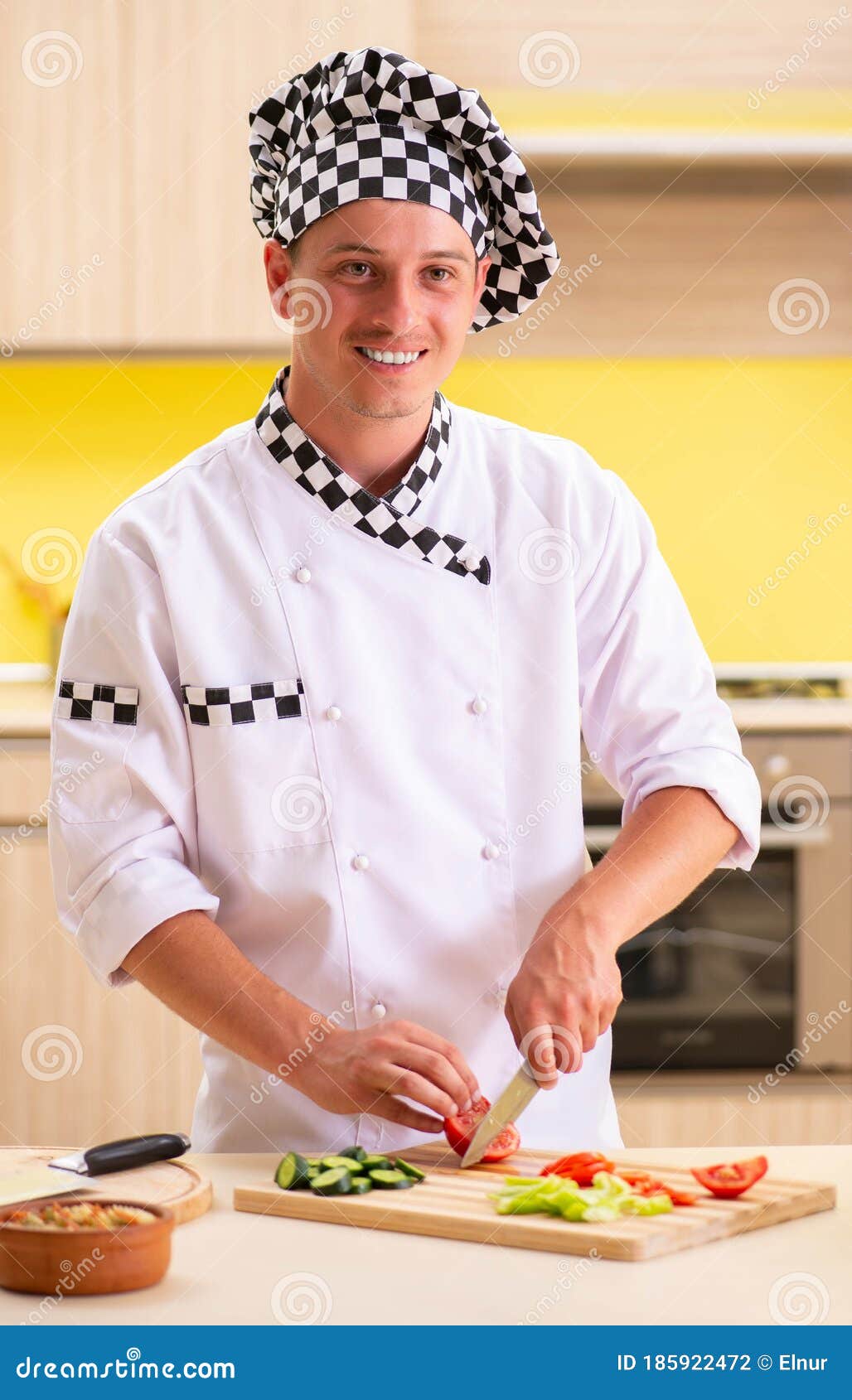 Young Professional Cook Preparing Salad at Kitchen Stock Photo - Image ...