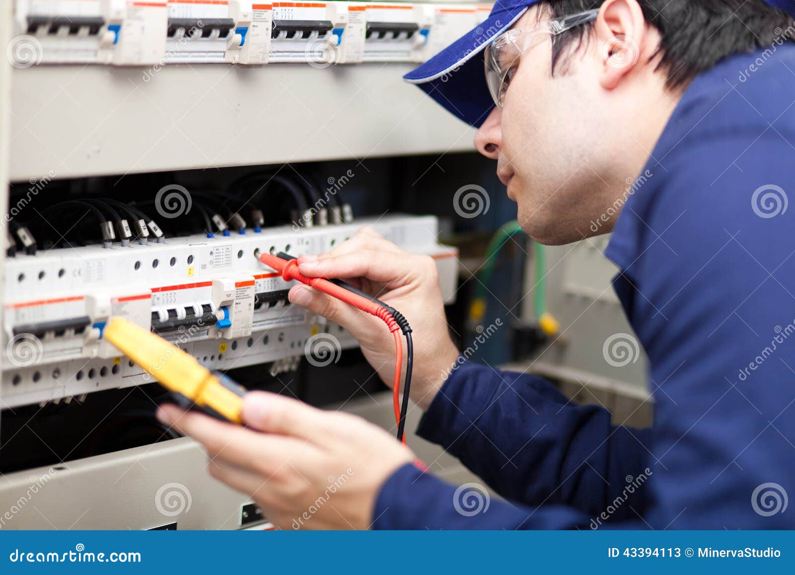 Young Professional Electrician while Working Stock Image - Image of ...