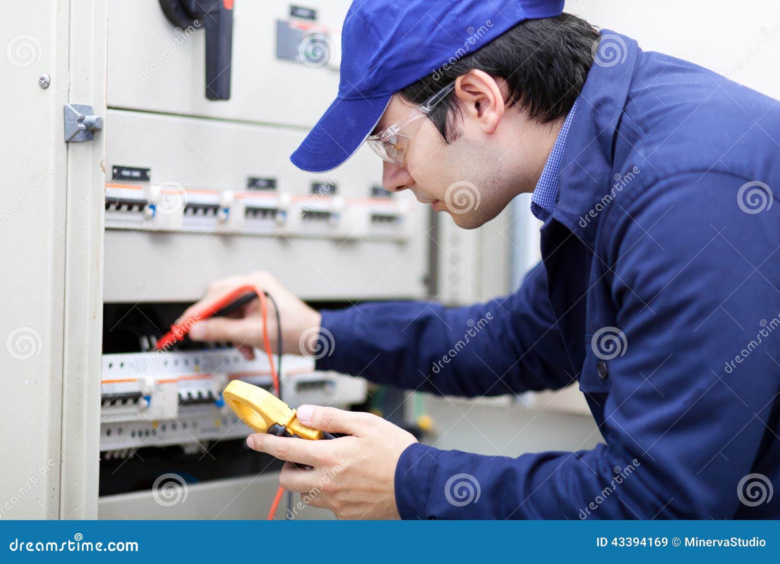Young Professional Electrician while Working Stock Image - Image of ...