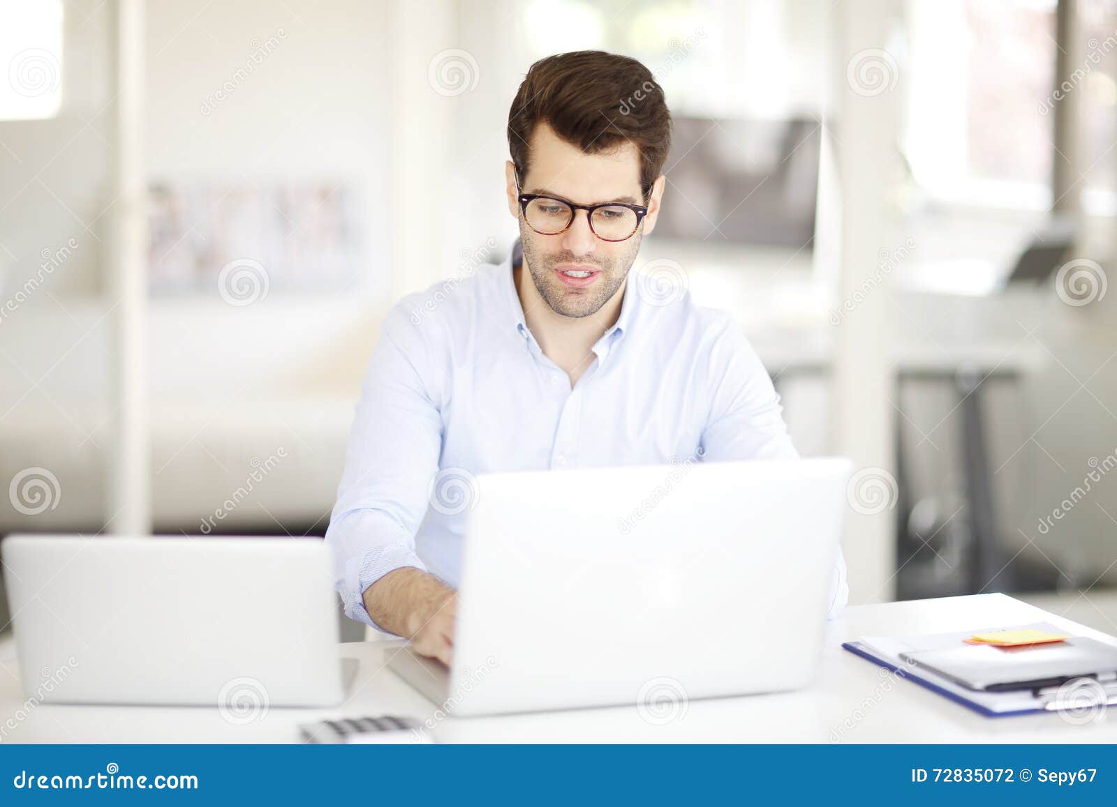 Young Professional Man at Office Stock Photo - Image of looking, office ...