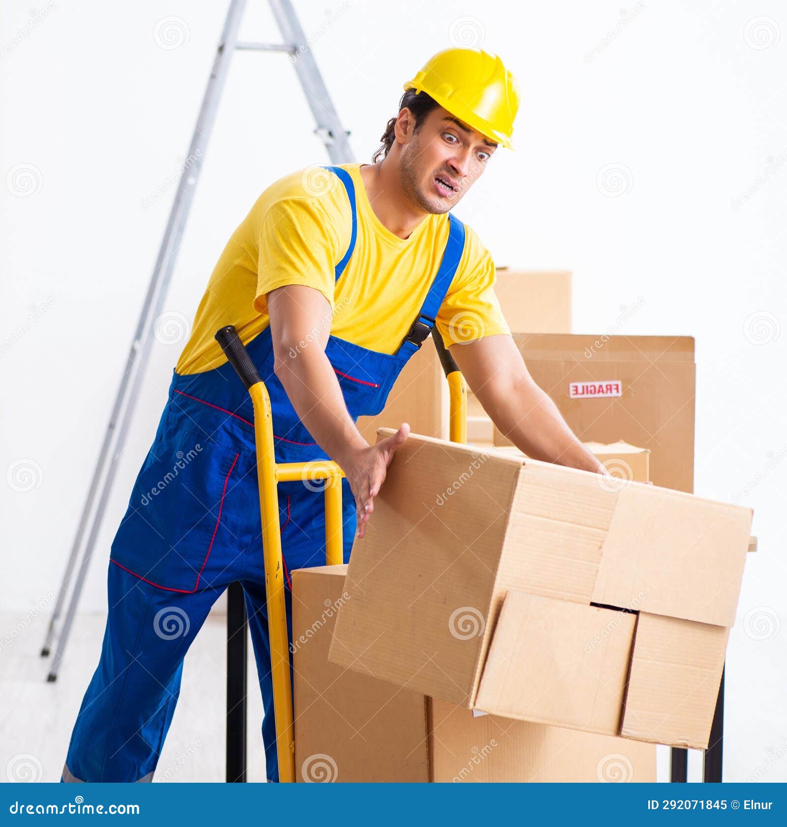 Young Male Professional Mover Doing Home Relocation Stock Image - Image ...