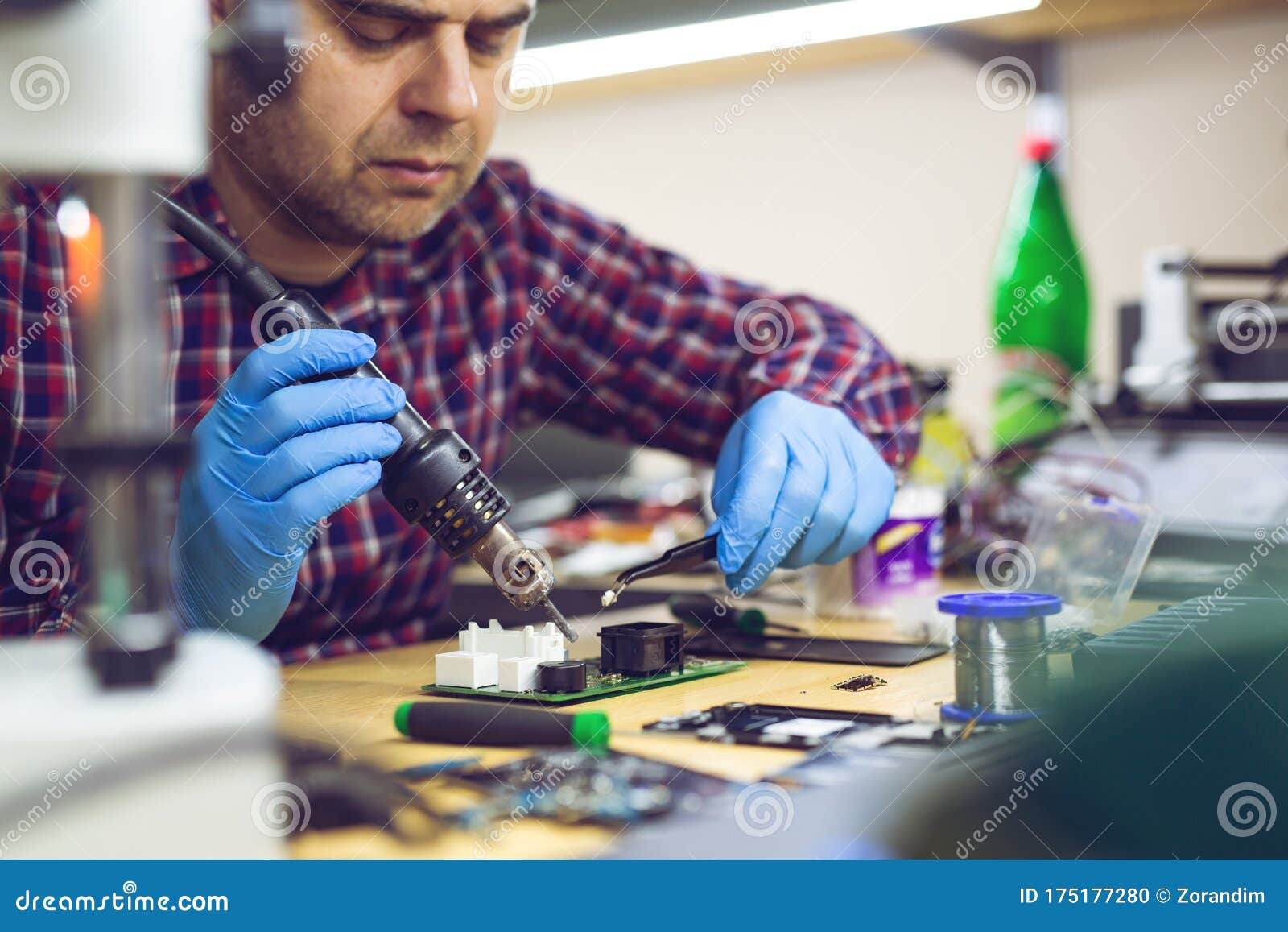 Professional Repairman Repairing Computer in Workshop. Stock Photo ...