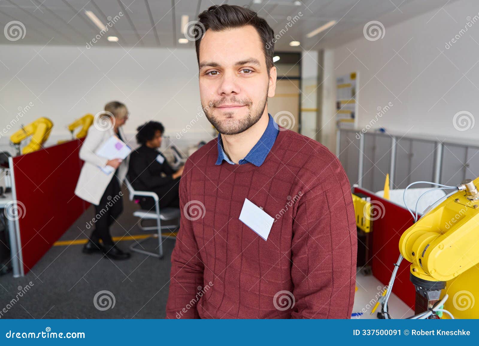 Young Professional in Robotics Training Environment with Industrial ...