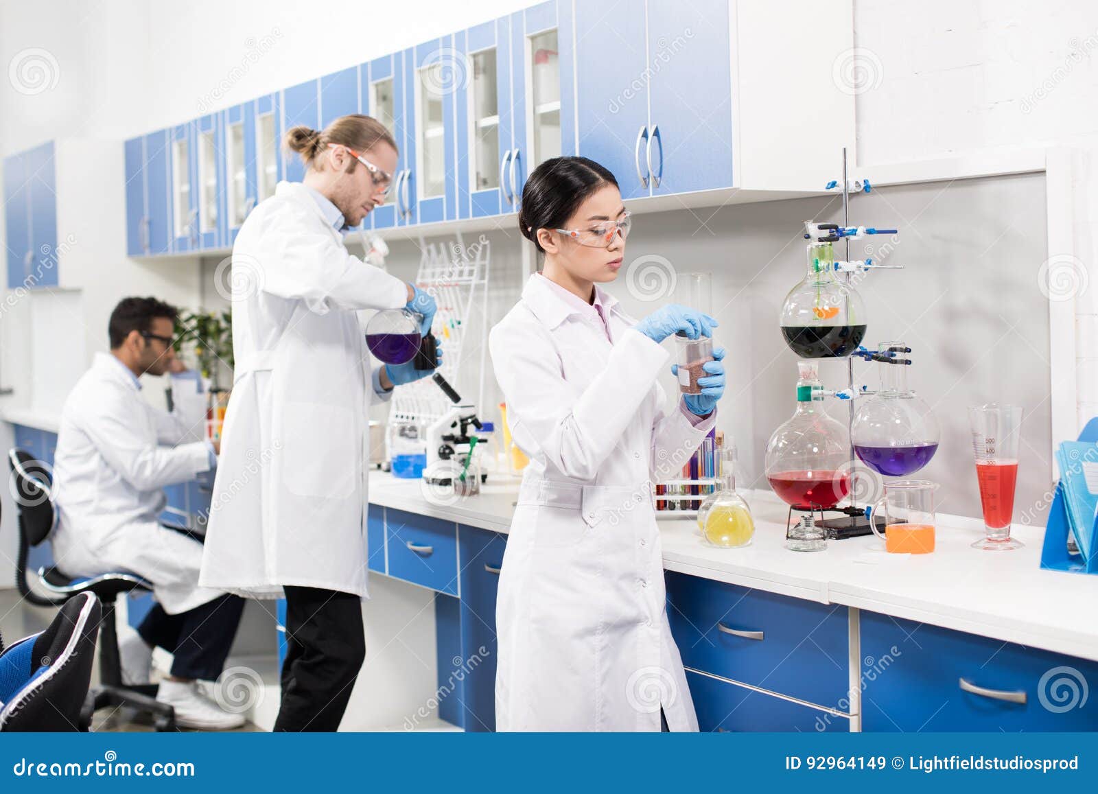 Young Professional Scientists Making Experiment in Research Laboratory ...