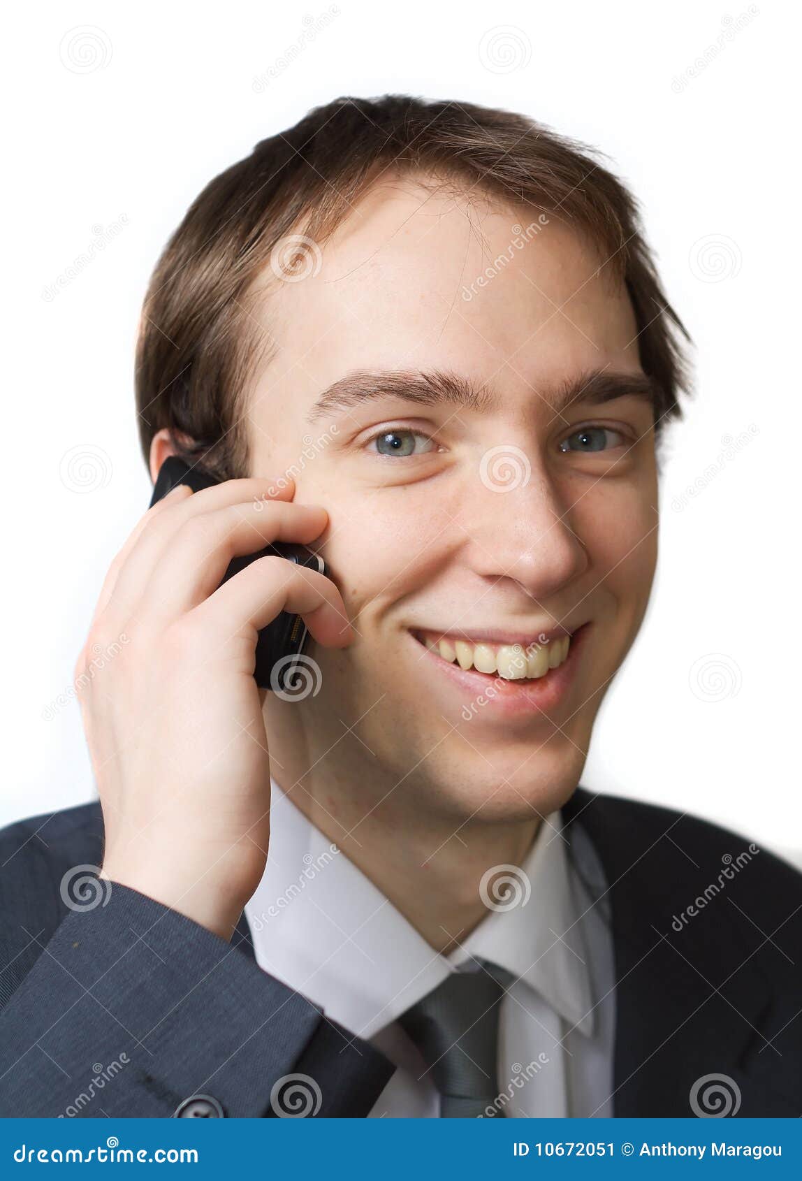 Young Professional Smiles while on the Phone Stock Image - Image of ...